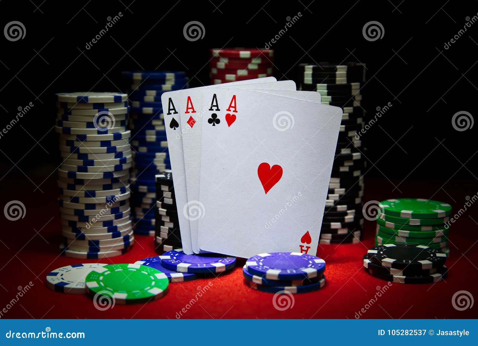 A Stack Of Chips Stay On Whitte Background With Roll Of Dollars And ...