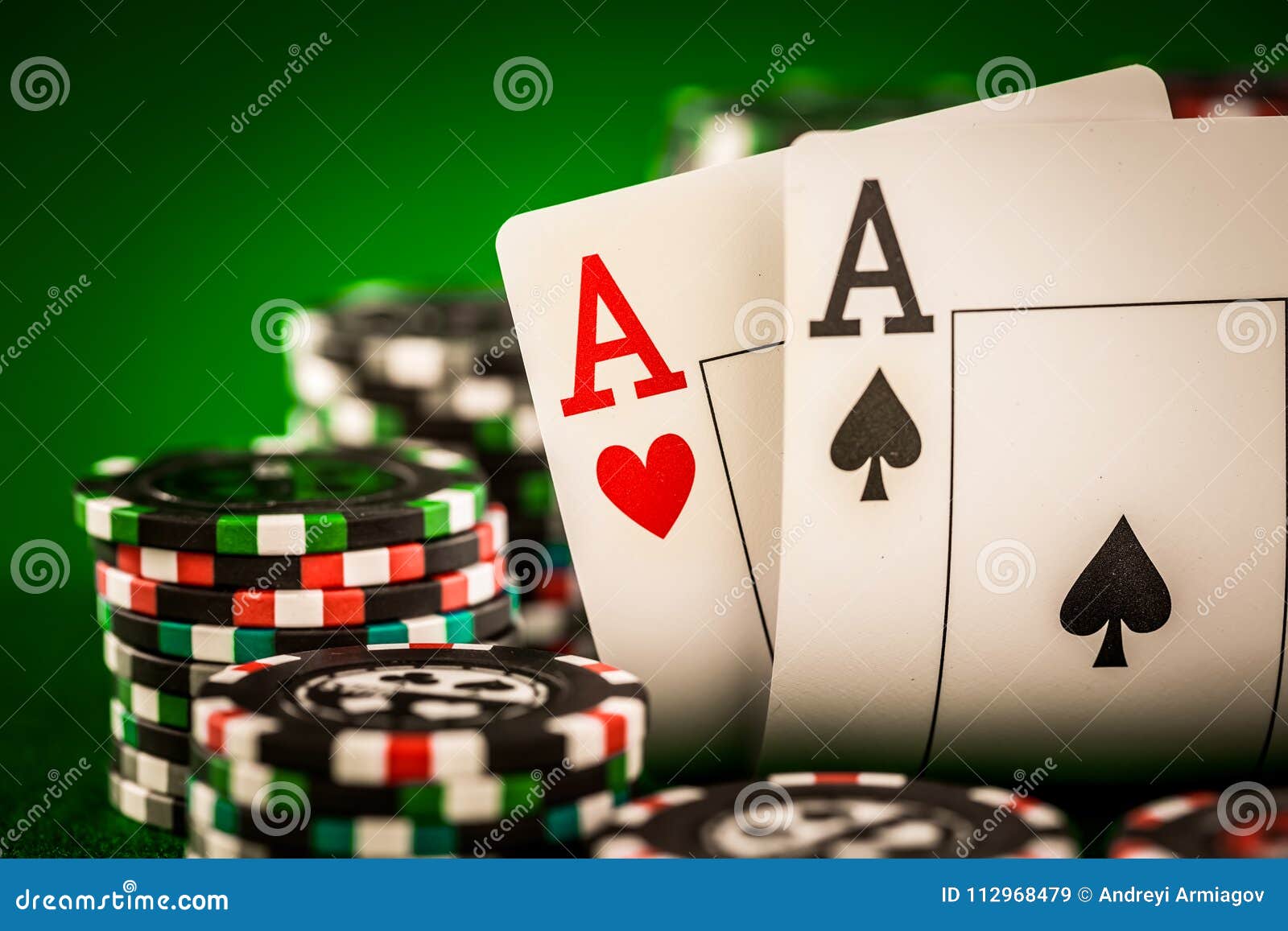 A Stack Of Chips Stay On Whitte Background With Roll Of Dollars And ...