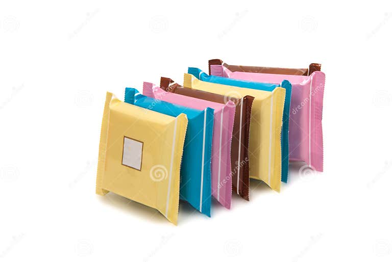 Stack of Chocolate Bars in Colorful Plastic Wrappers Stock Photo ...