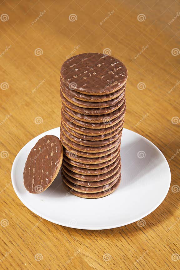 Stack of Chocolate Biscuits in Plate Stock Image - Image of table ...