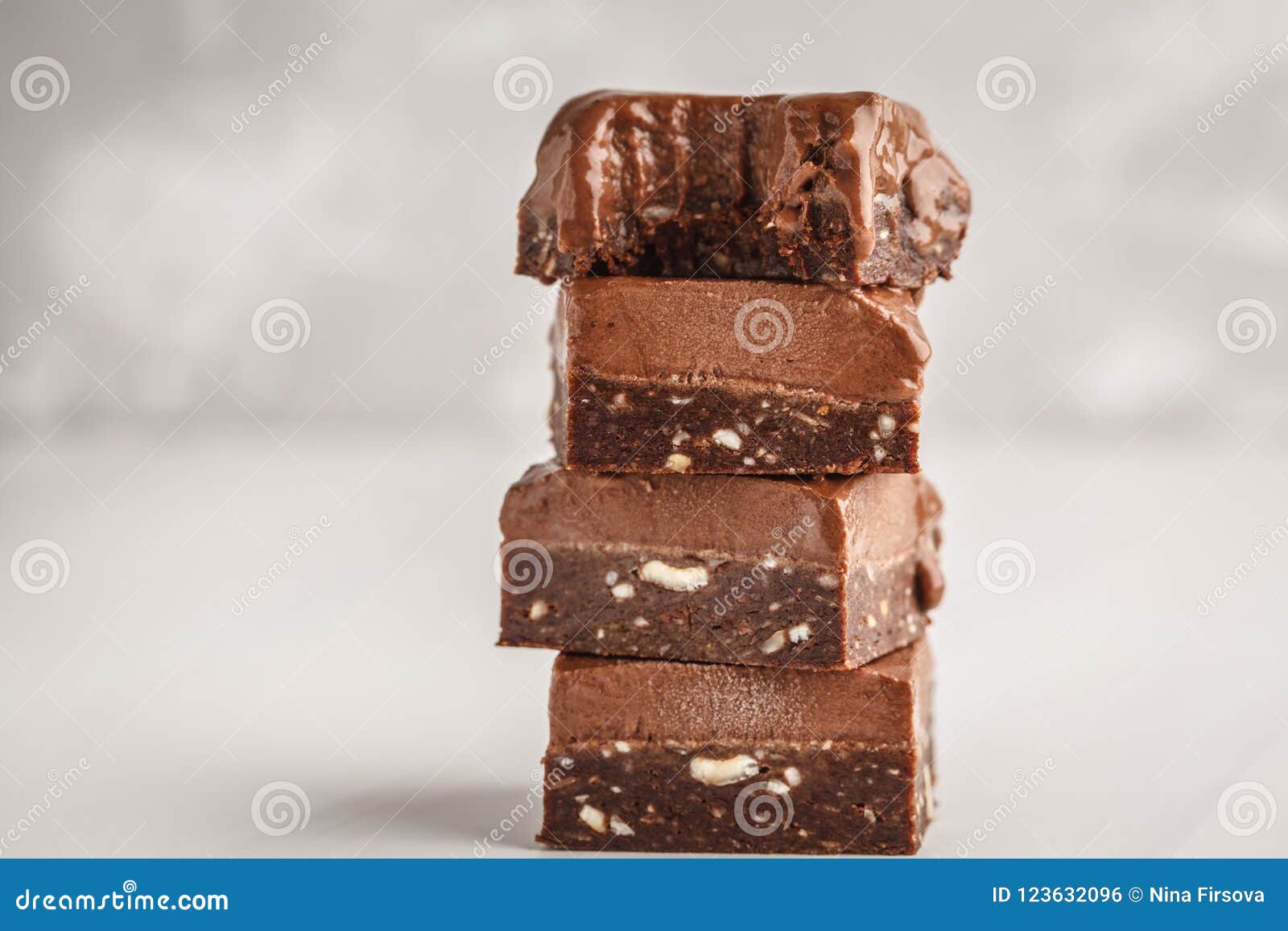 Stack of Chocolate Fudge Bars on White Background. Raw Vegan Dessrt ...