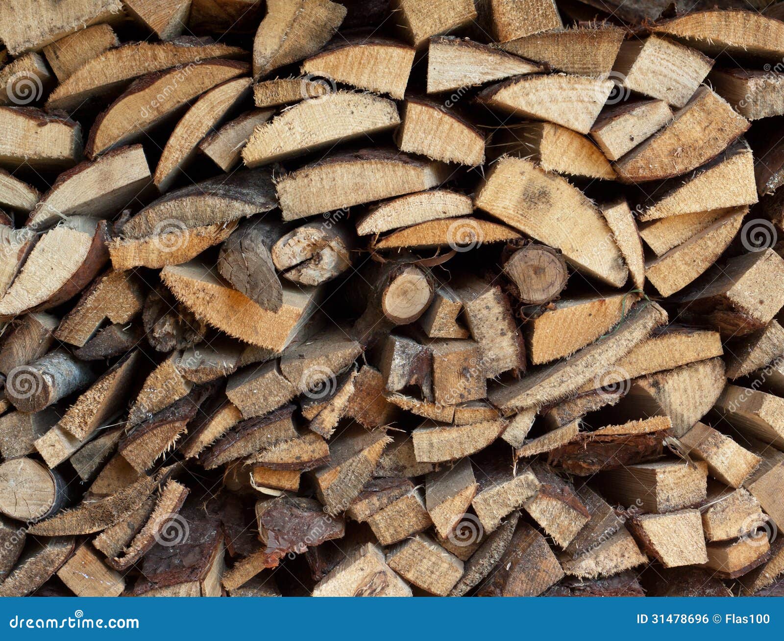 Chopped Firewood Stacked Between Two Trees Royalty-Free Stock Photo ...