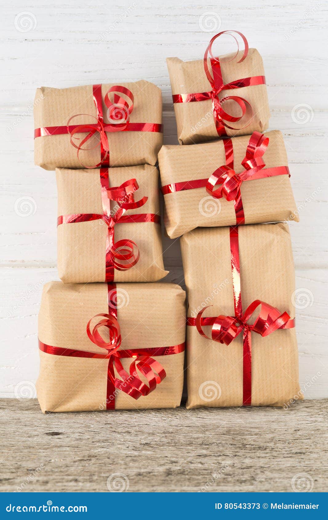 Stack of Christmas Presents on a Table Stock Image - Image of holiday ...