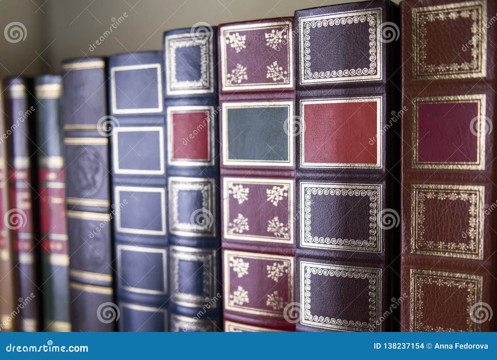 A Stack of Classic Books on the Bookshelf Stock Photo - Image of rack ...