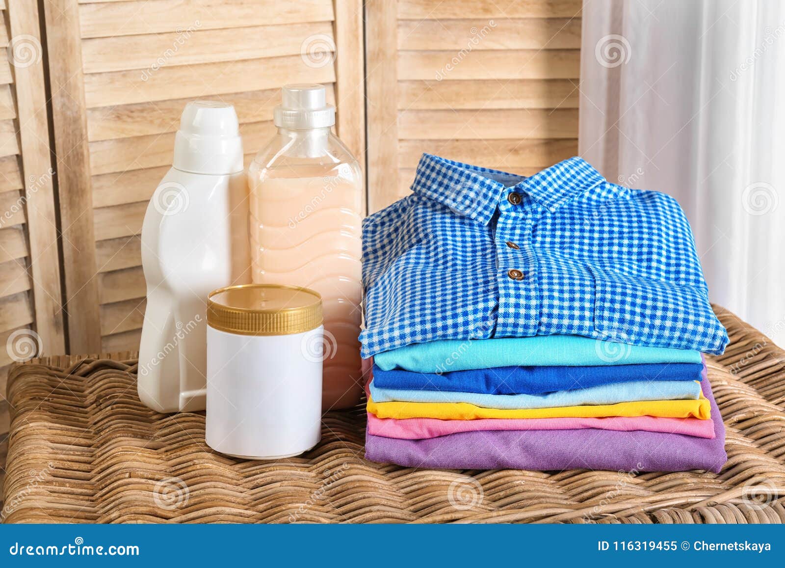 Stack of Clean Clothes and Bottles with Detergent Stock Image - Image ...