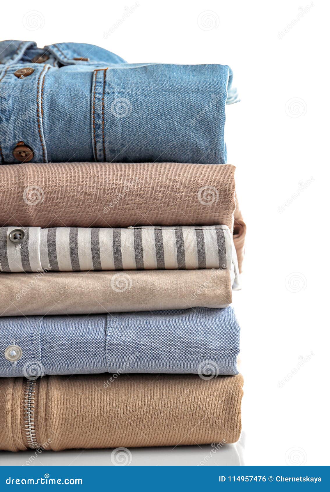 Stack of clean clothes stock photo. Image of stacked - 114957476