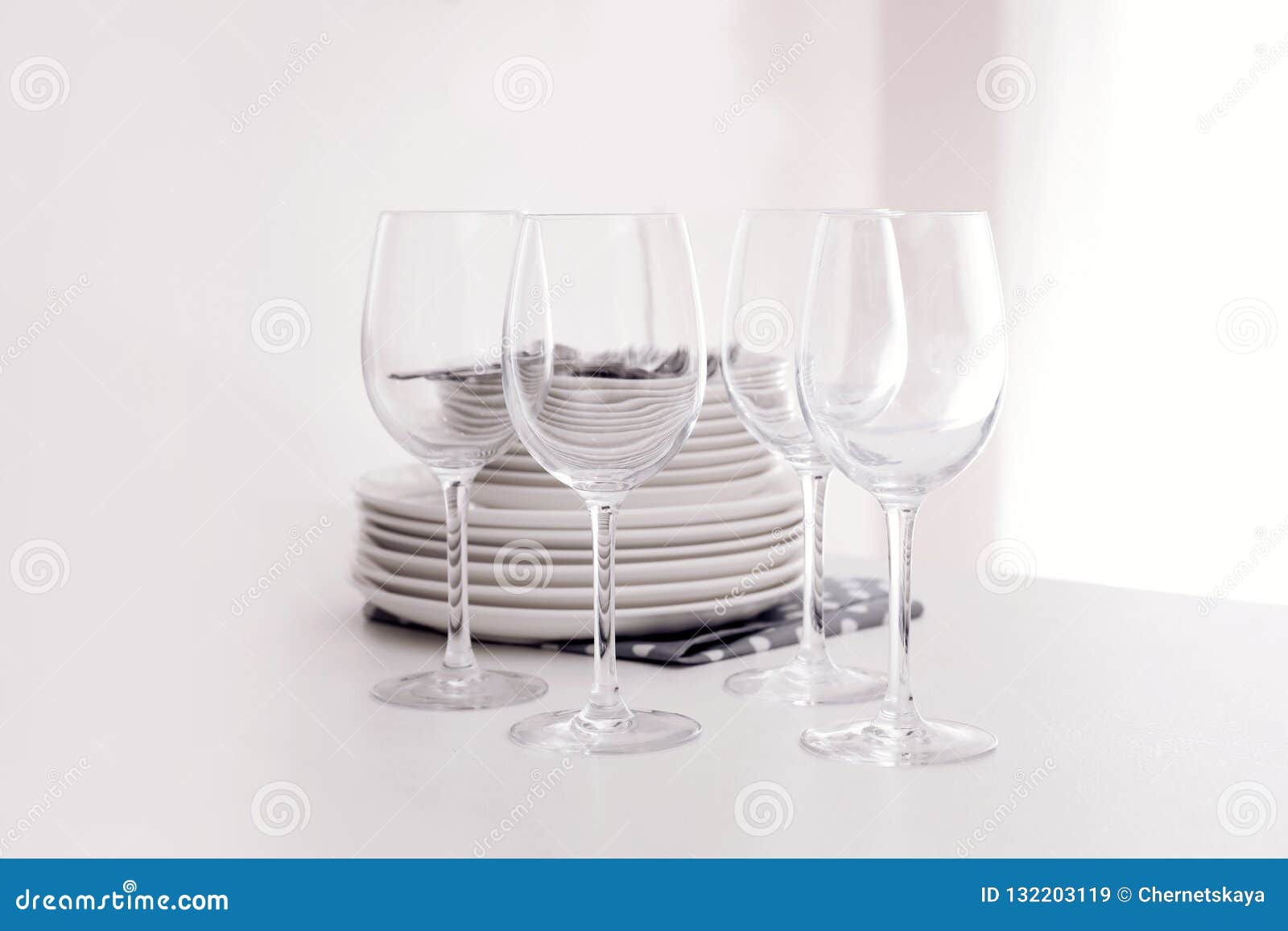 Stack of Clean Dishes and Glasses on Table Stock Image - Image of dish ...