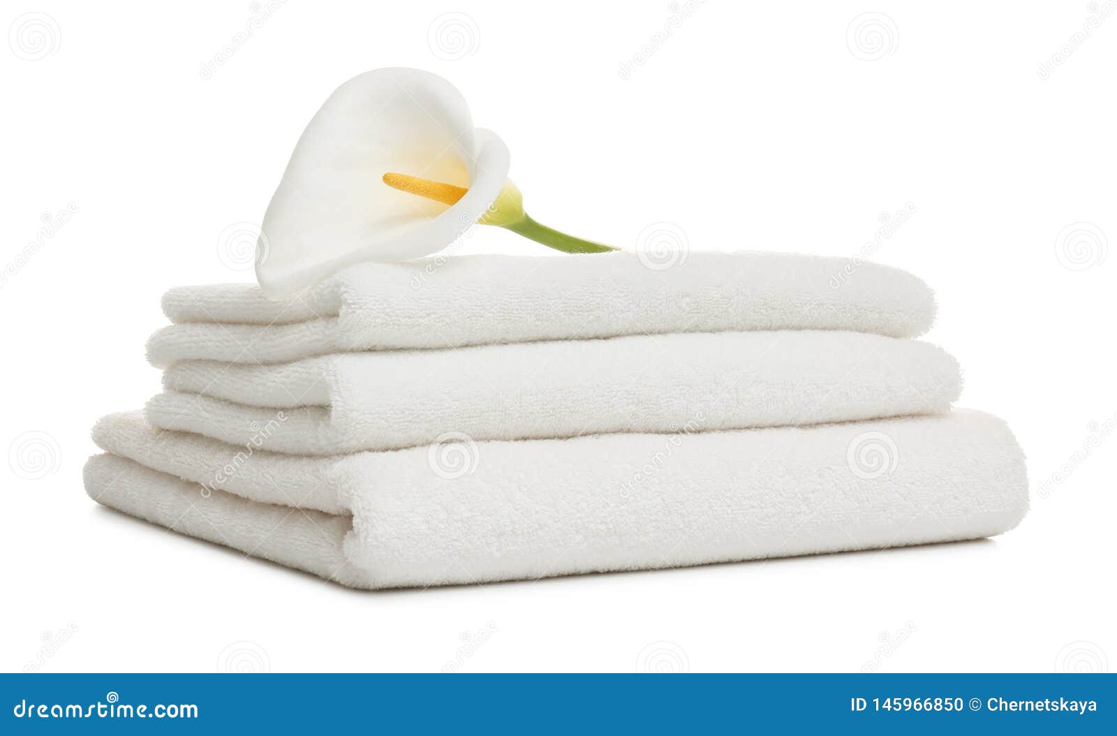 Stack of Clean Folded Towels with Flower Stock Photo - Image of object ...
