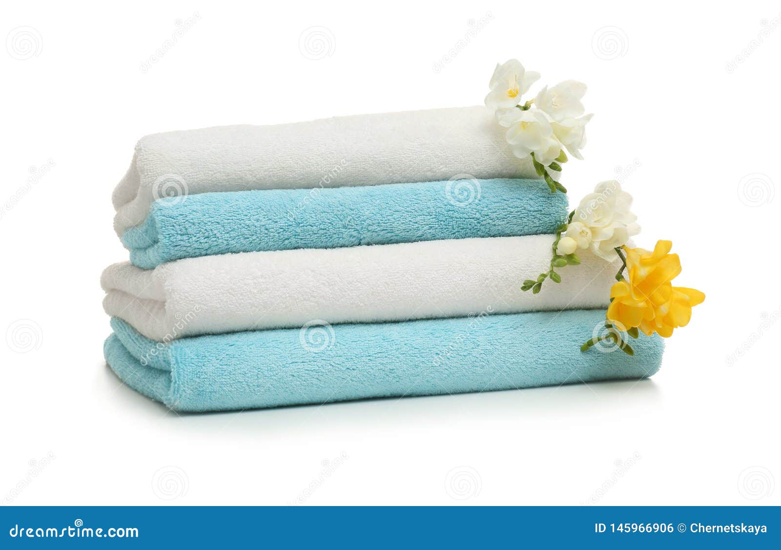 Stack of Clean Folded Towels with Flowers Stock Photo - Image of ...