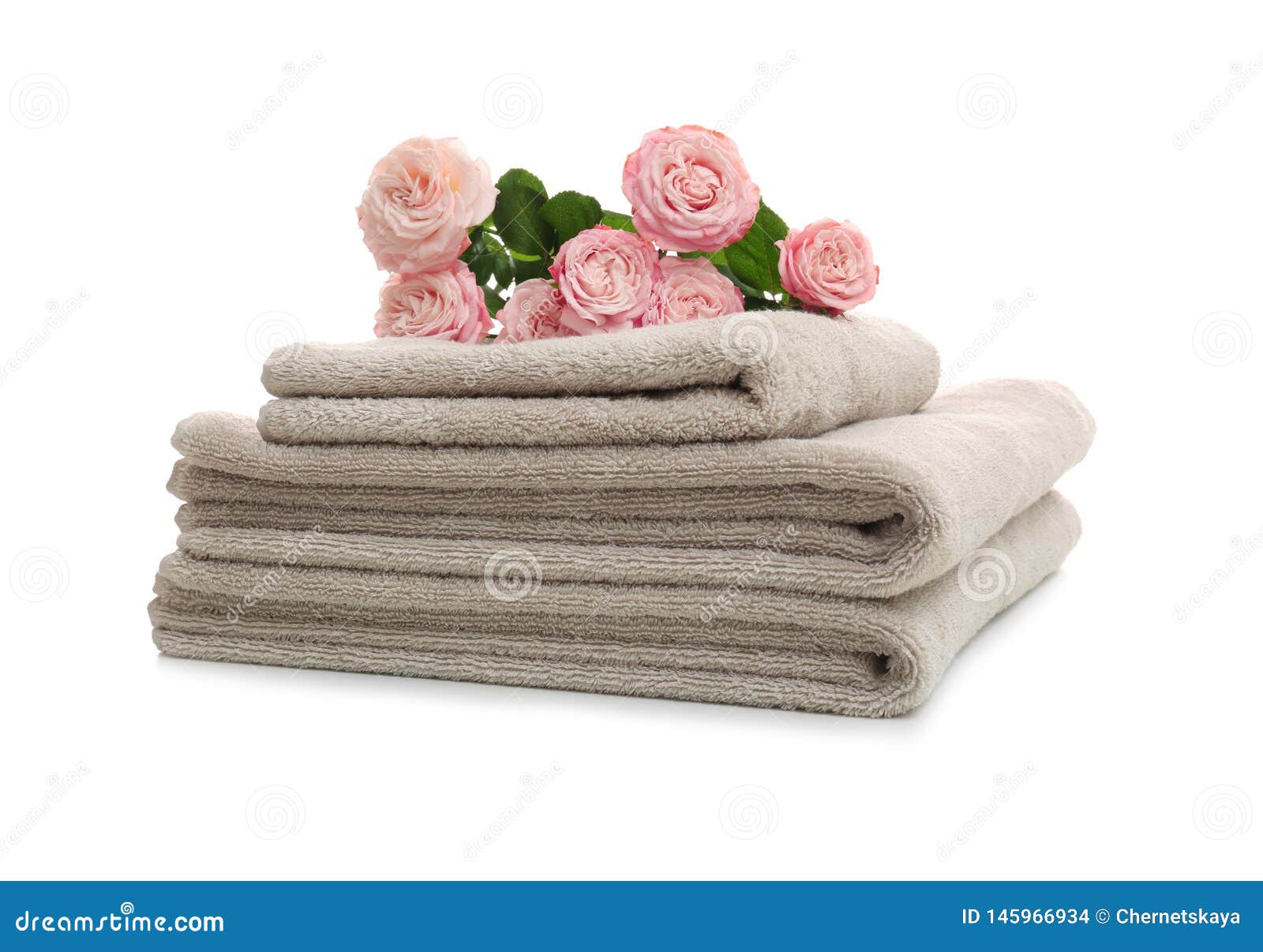Stack of Clean Folded Towels with Flowers Stock Photo - Image of body ...