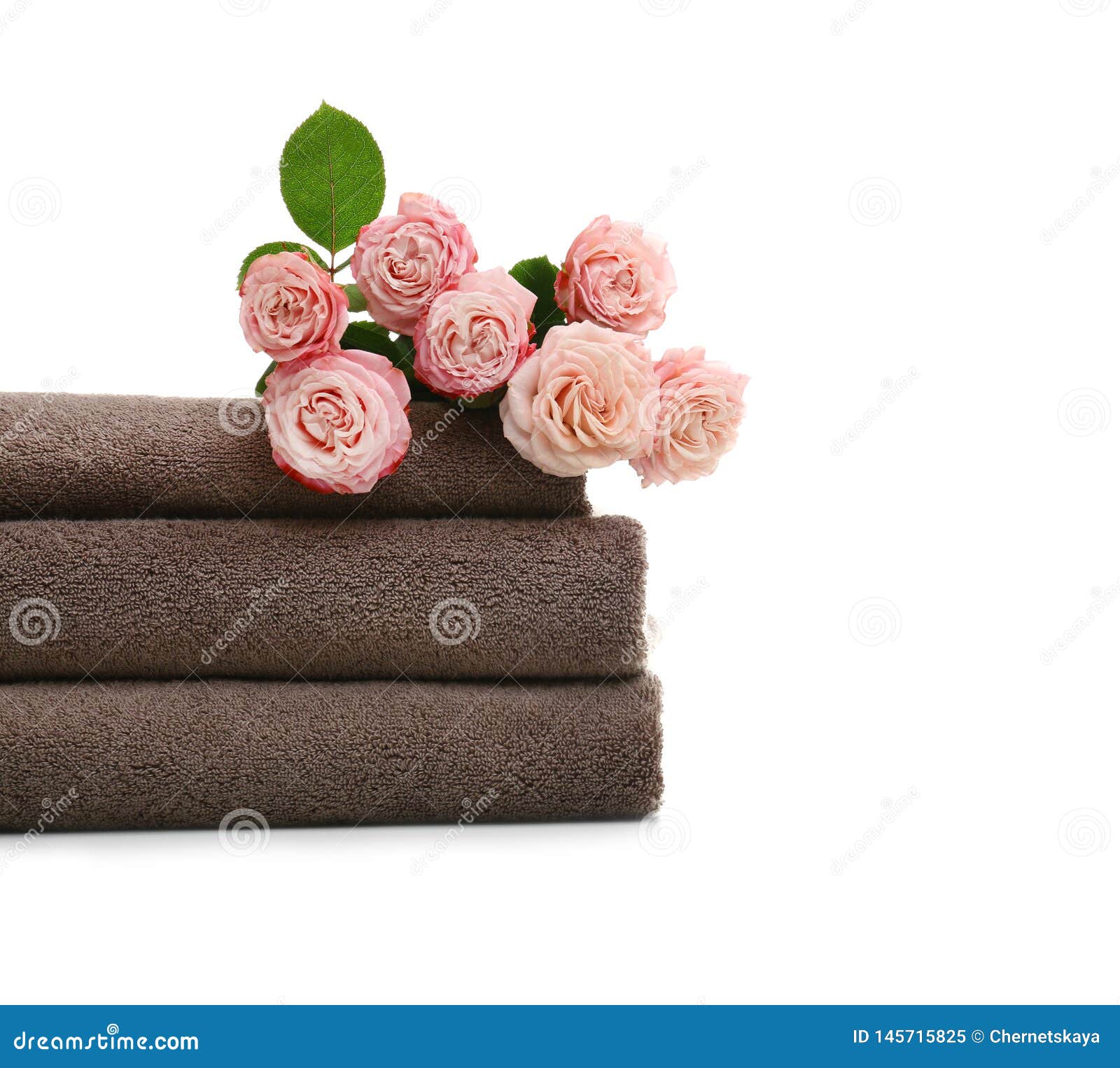 Stack of Clean Folded Towels with Flowers on White Stock Image - Image ...