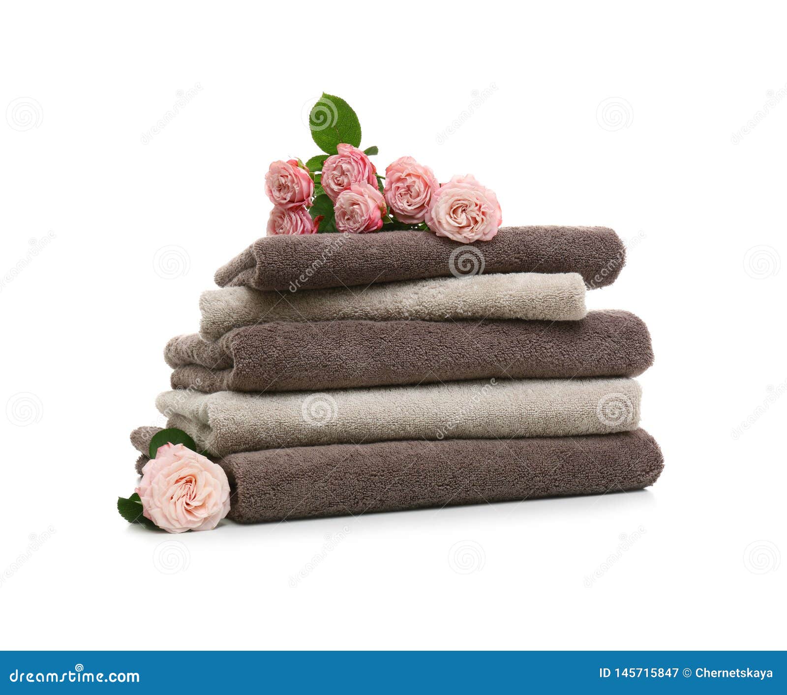 Stack of Clean Folded Towels with Flowers on White Stock Image - Image ...