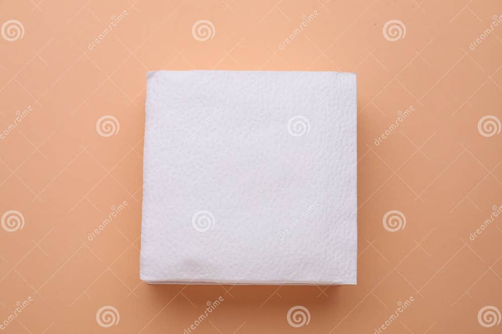 Stack of Clean Paper Tissues on Beige Background, Top View Stock Photo ...