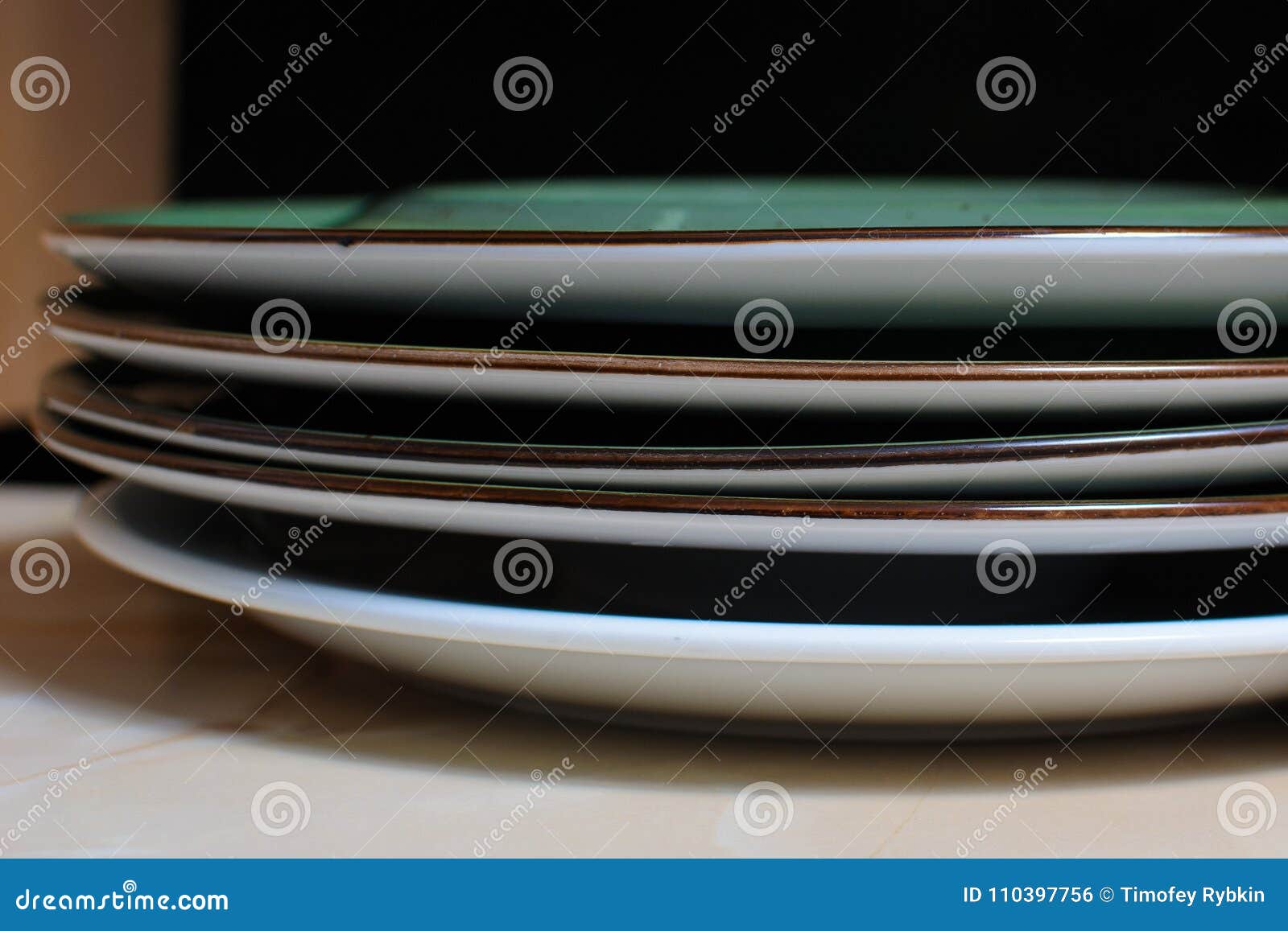 A Stack of Clean Plates is on the Table Stock Photo - Image of ...