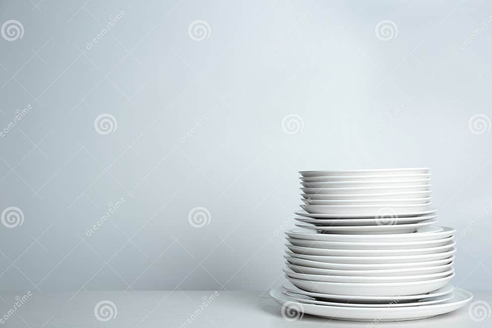 Stack of Clean Plates on Background Stock Image - Image of breakfast ...
