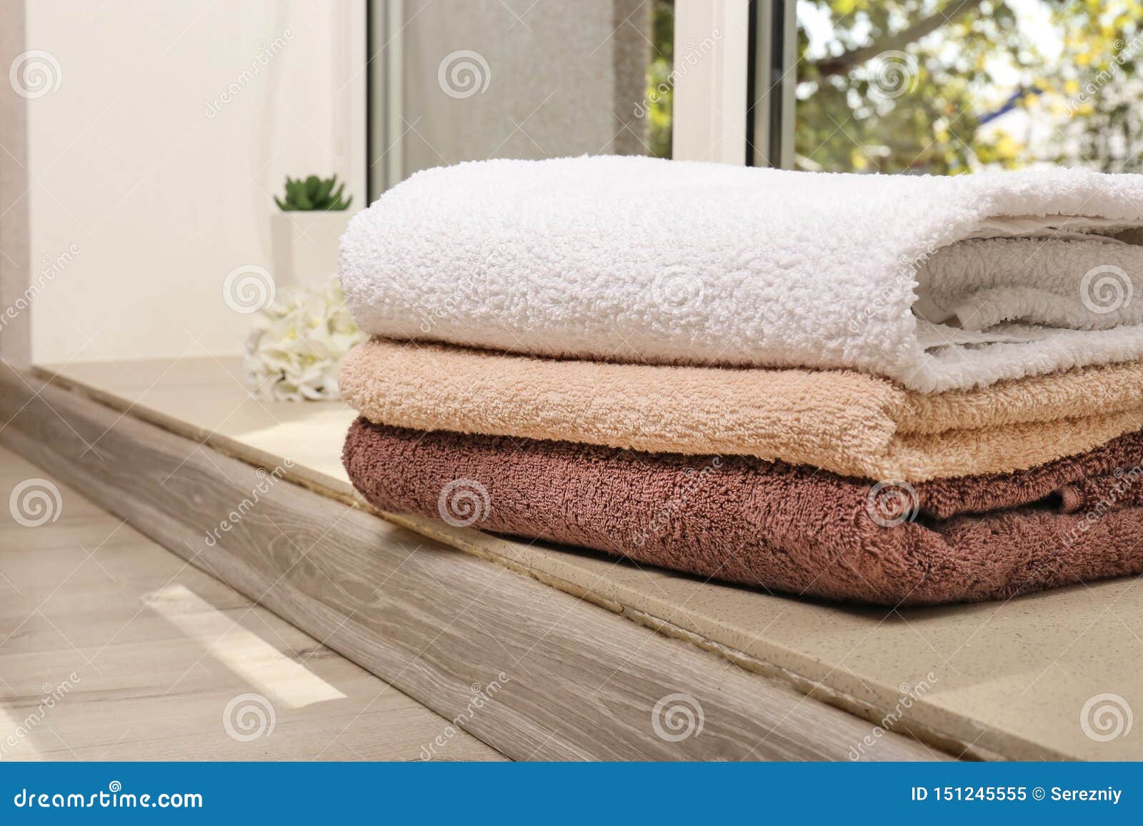 Stack of Clean Soft Towels on Floor Indoors Stock Image - Image of ...