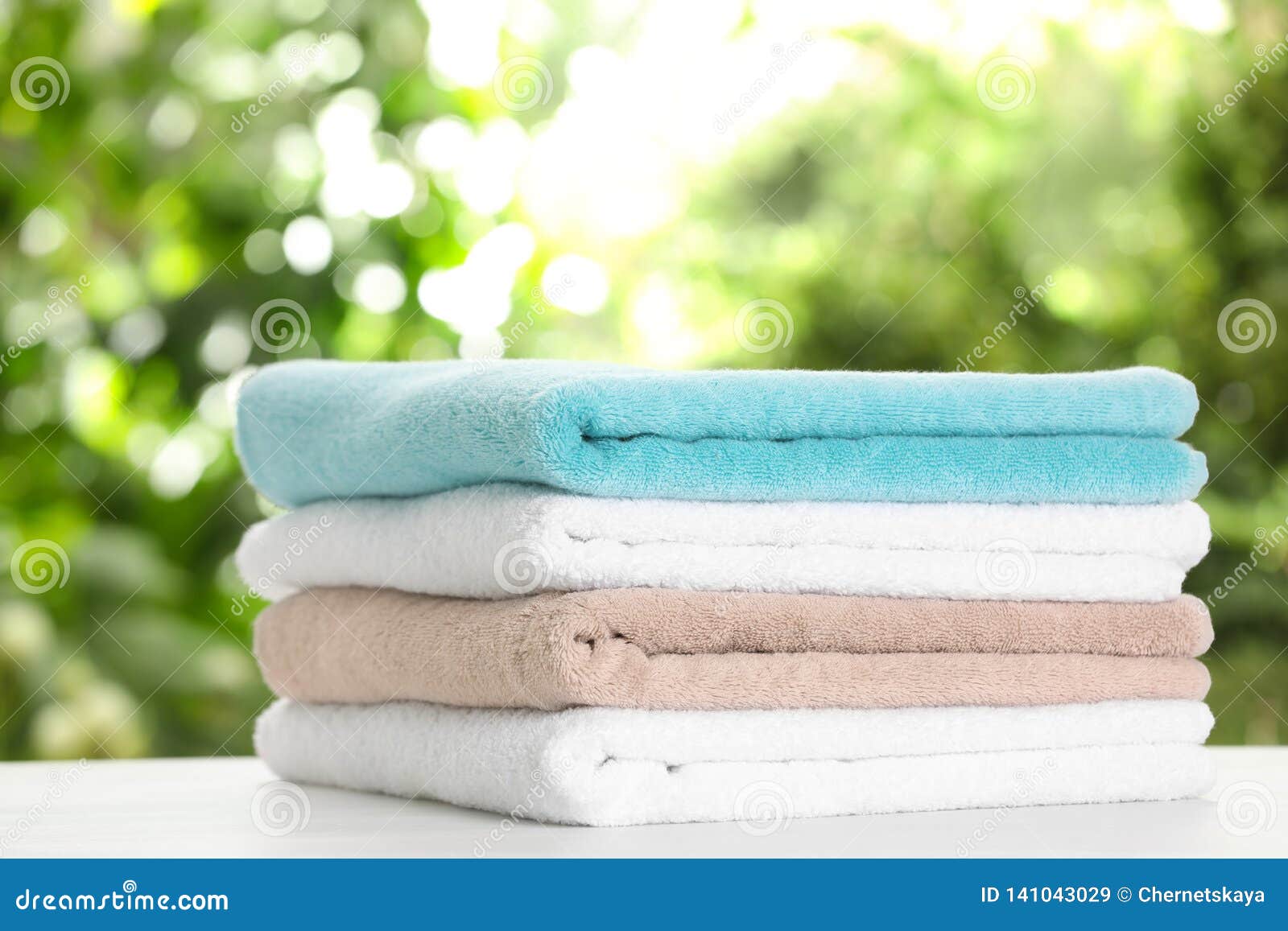 Stack of Clean Soft Towels on Table Stock Image - Image of domestic ...