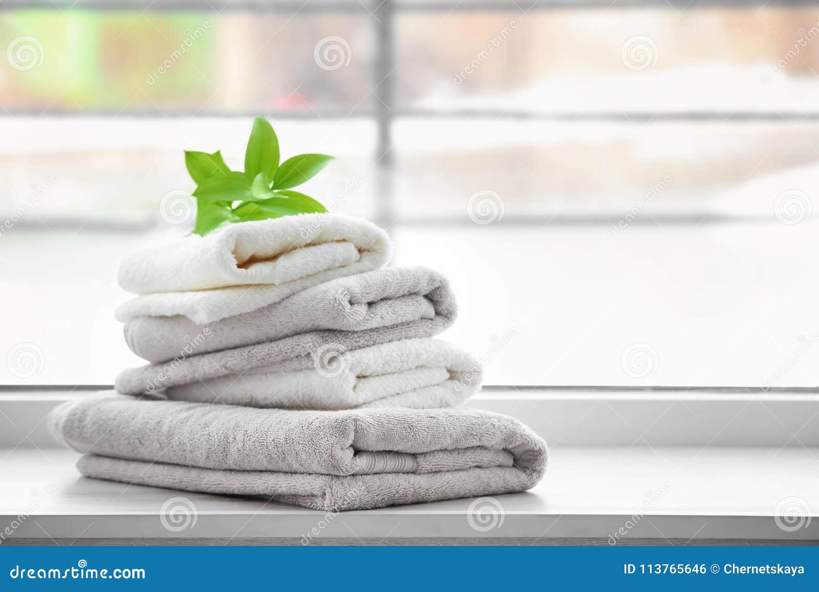 Stack of clean towels stock photo. Image of hotel, branch - 113765646