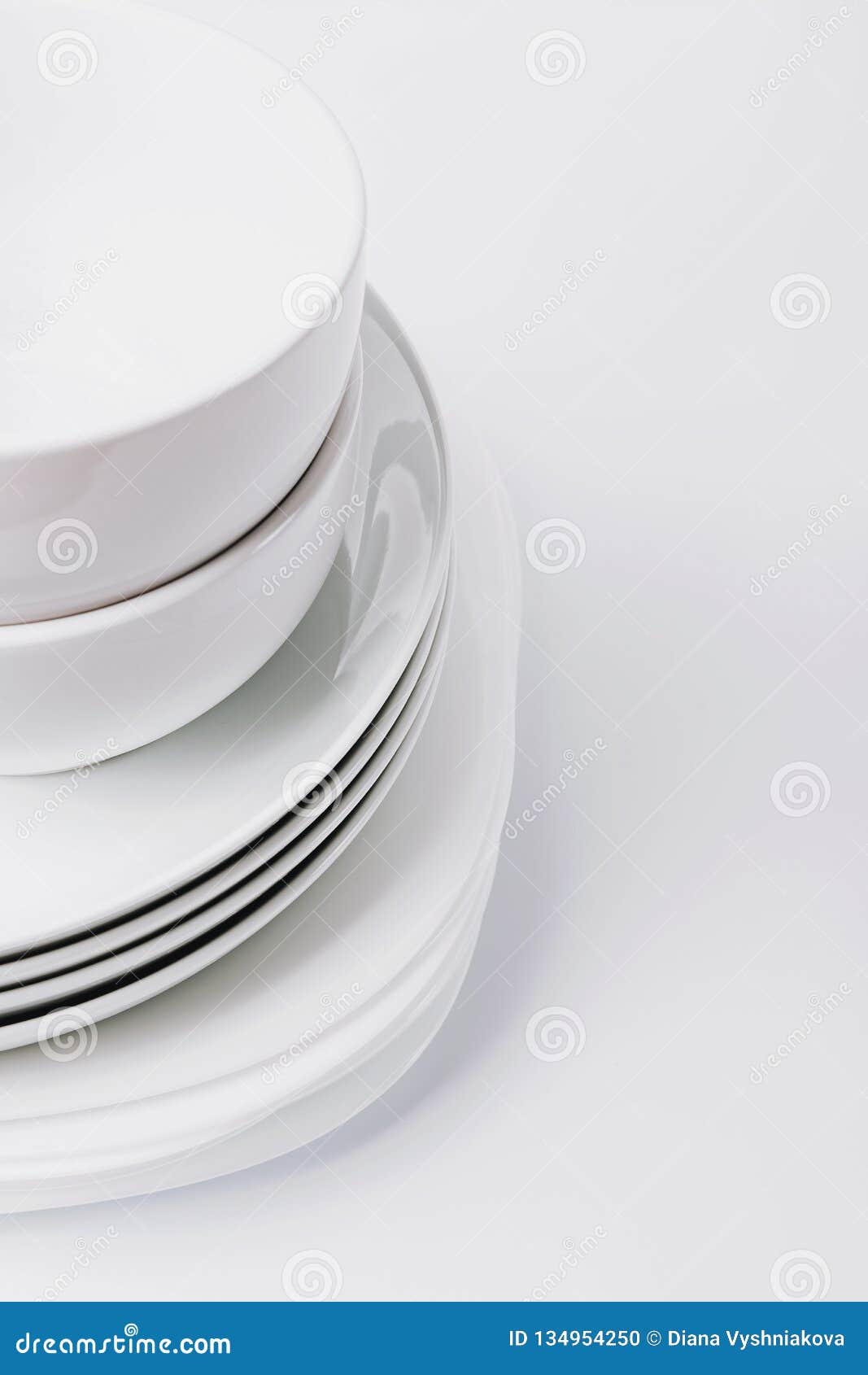 Stack of Clean White Dishes and Bowls Stock Photo - Image of plates ...