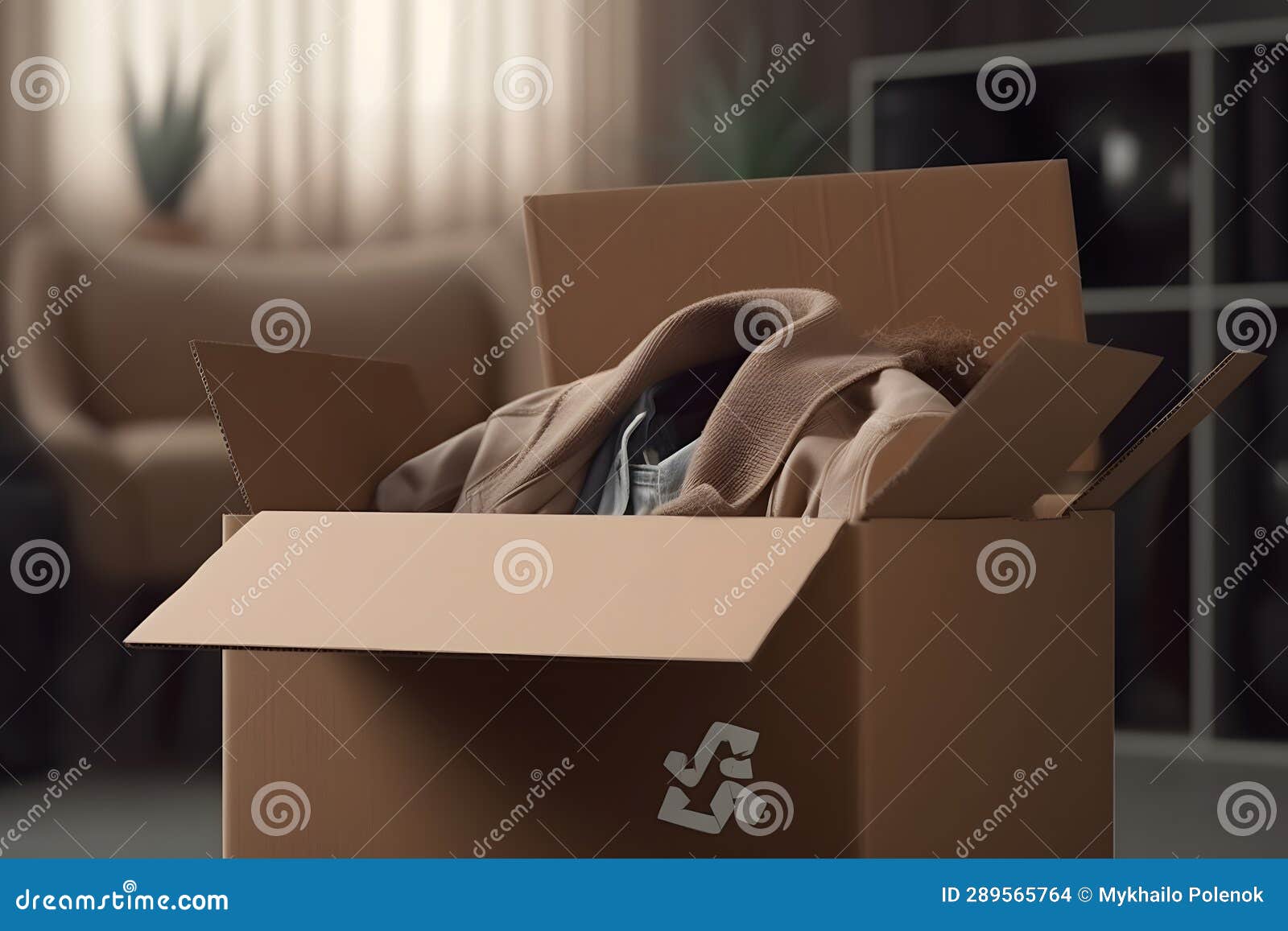 A Stack of Clothes in Different Colors in a Box. the Concept of ...