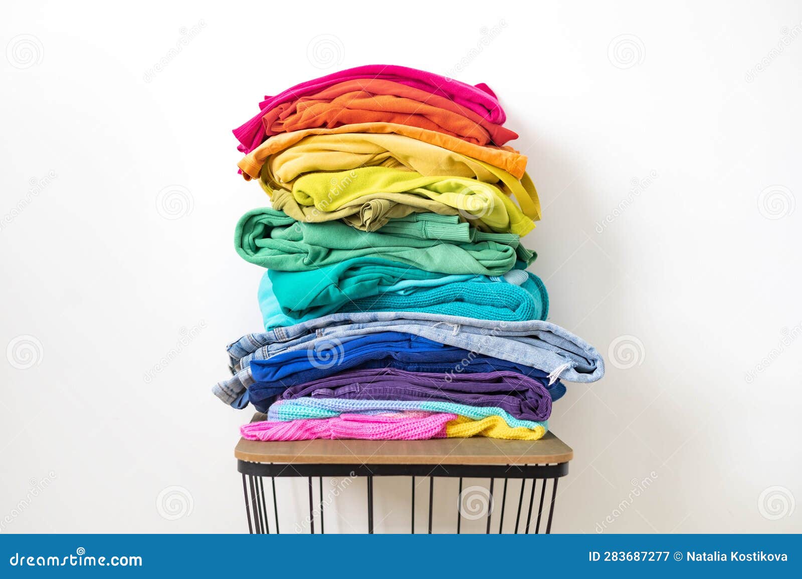 A Stack of Clothes in Different Colors. the Concept of Conscious ...