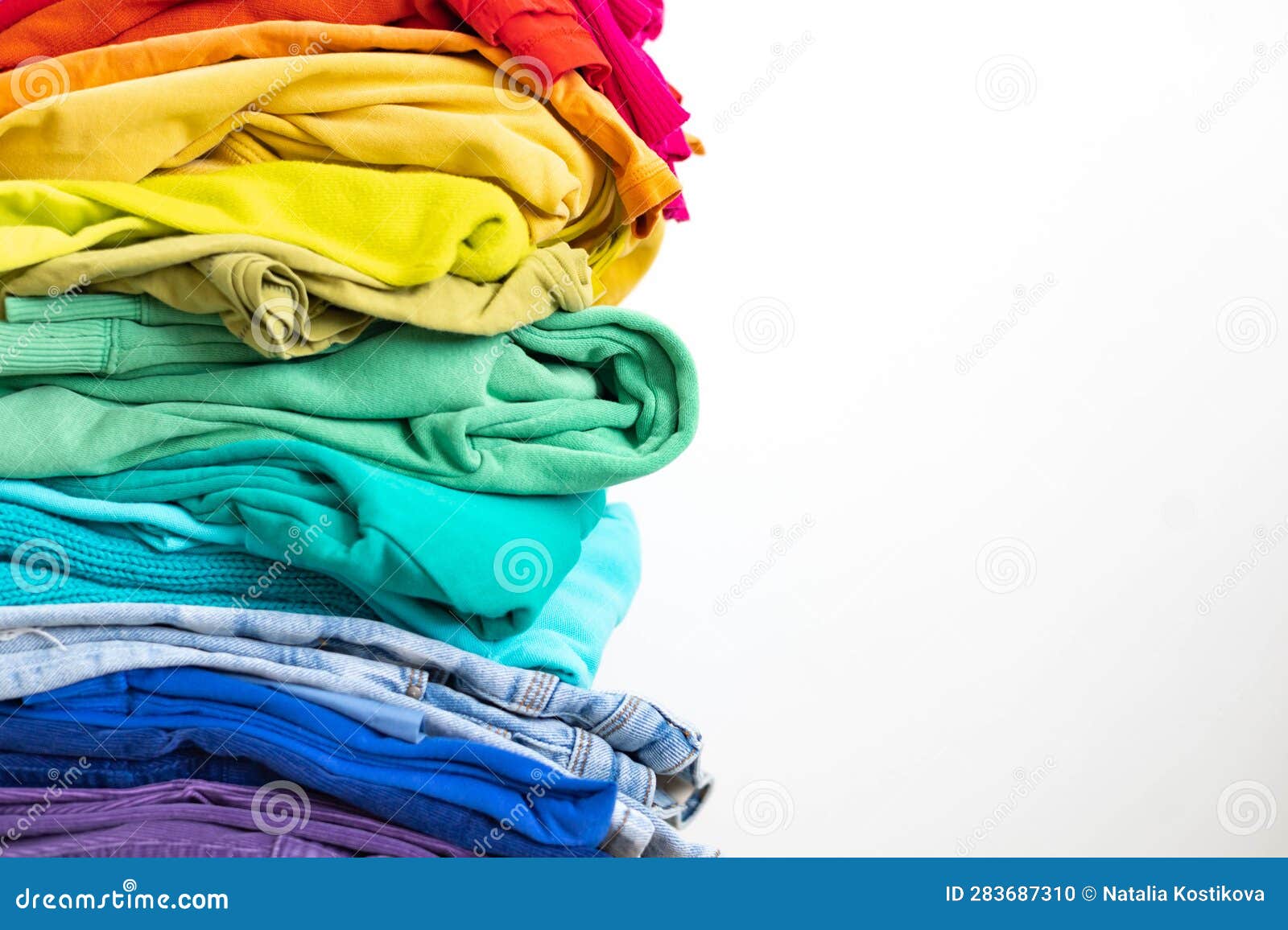 A Stack of Clothes in Different Colors. the Concept of Conscious ...