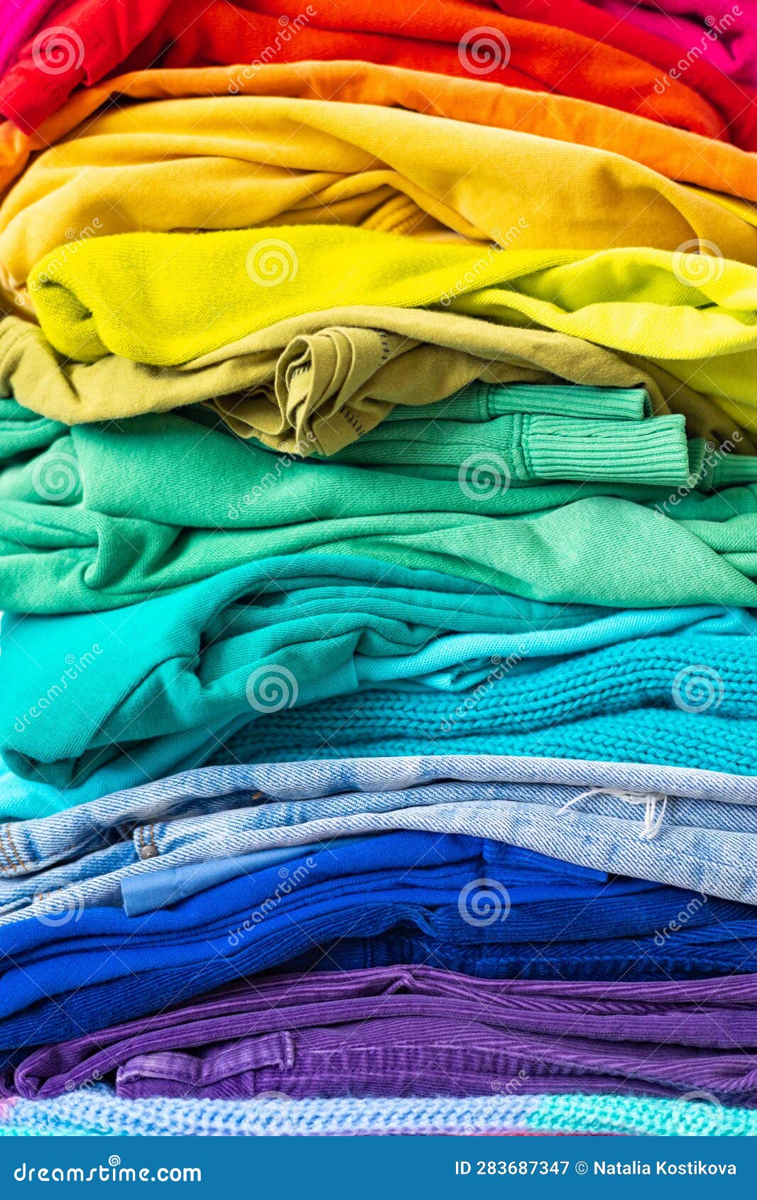 A Stack of Clothes in Different Colors. the Concept of Conscious ...