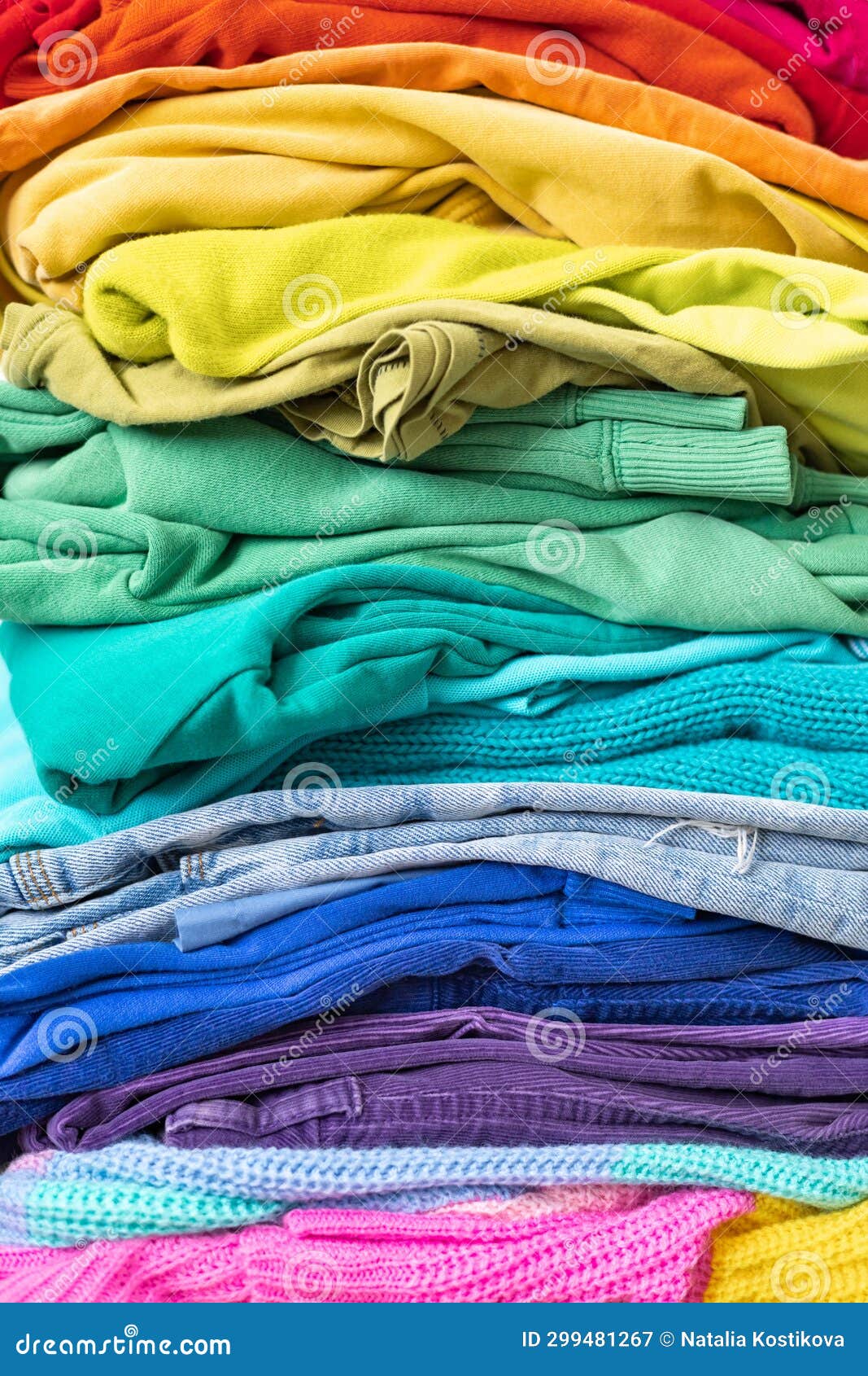 A Stack of Clothes in Different Colors. the Concept of Conscious ...