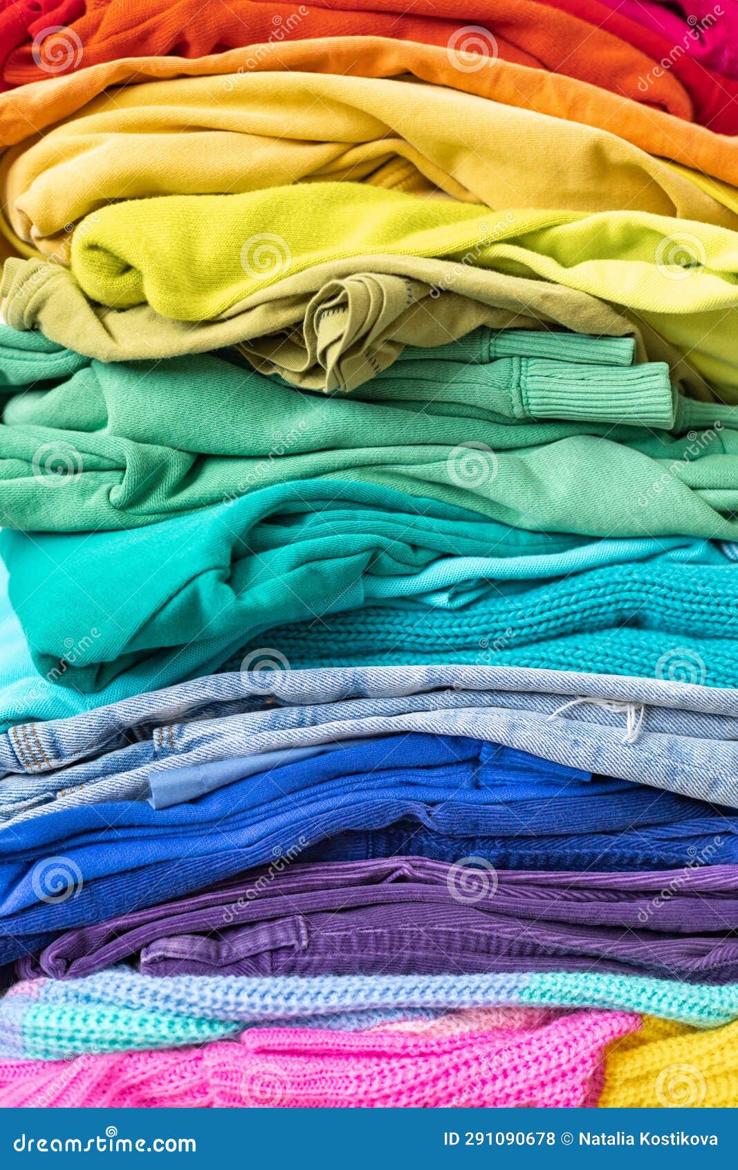 A Stack of Clothes in Different Colors. the Concept of Conscious ...