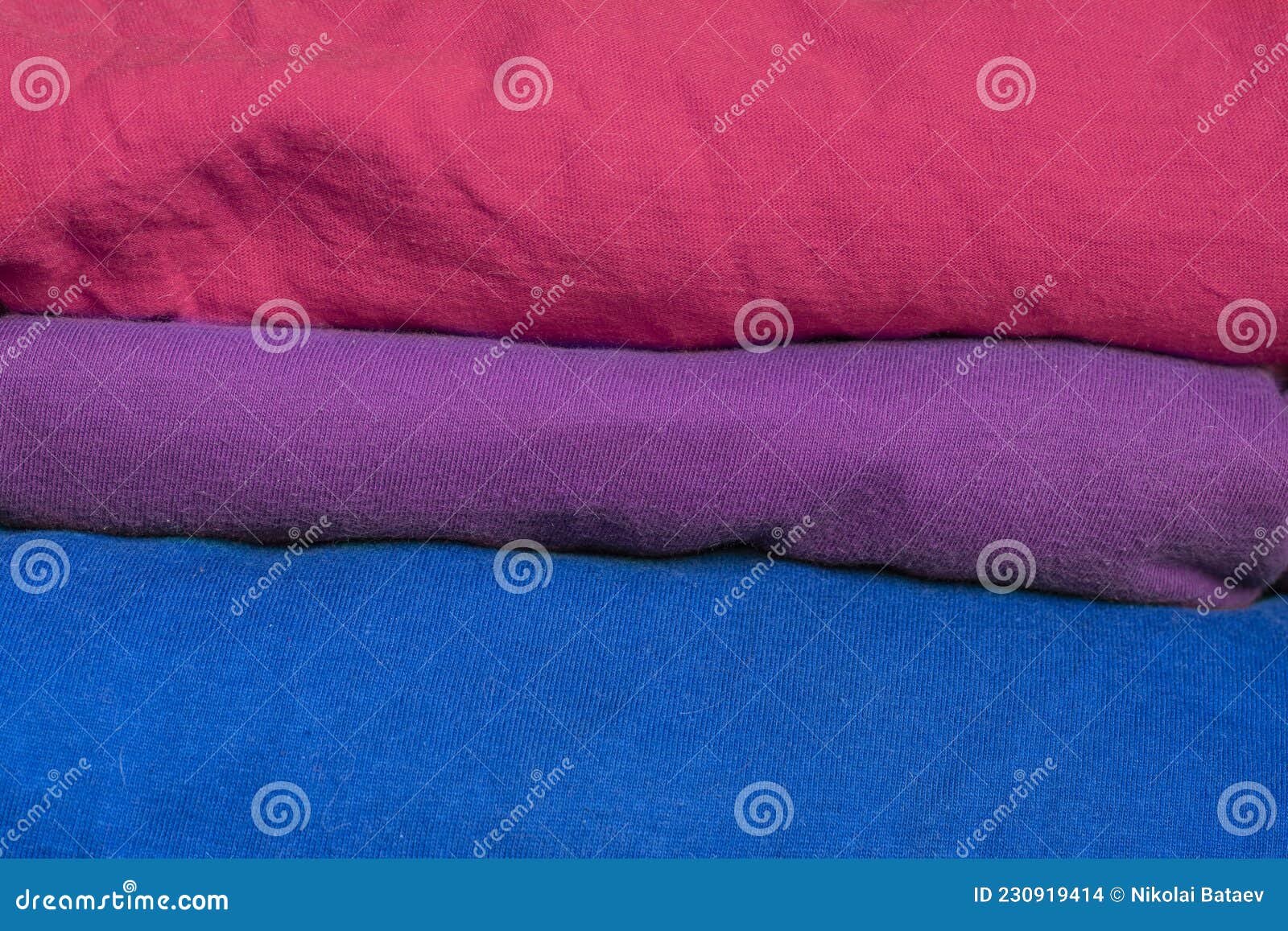 A Stack of Clothes Folded in the Colors of the Bisexual Community Flag ...