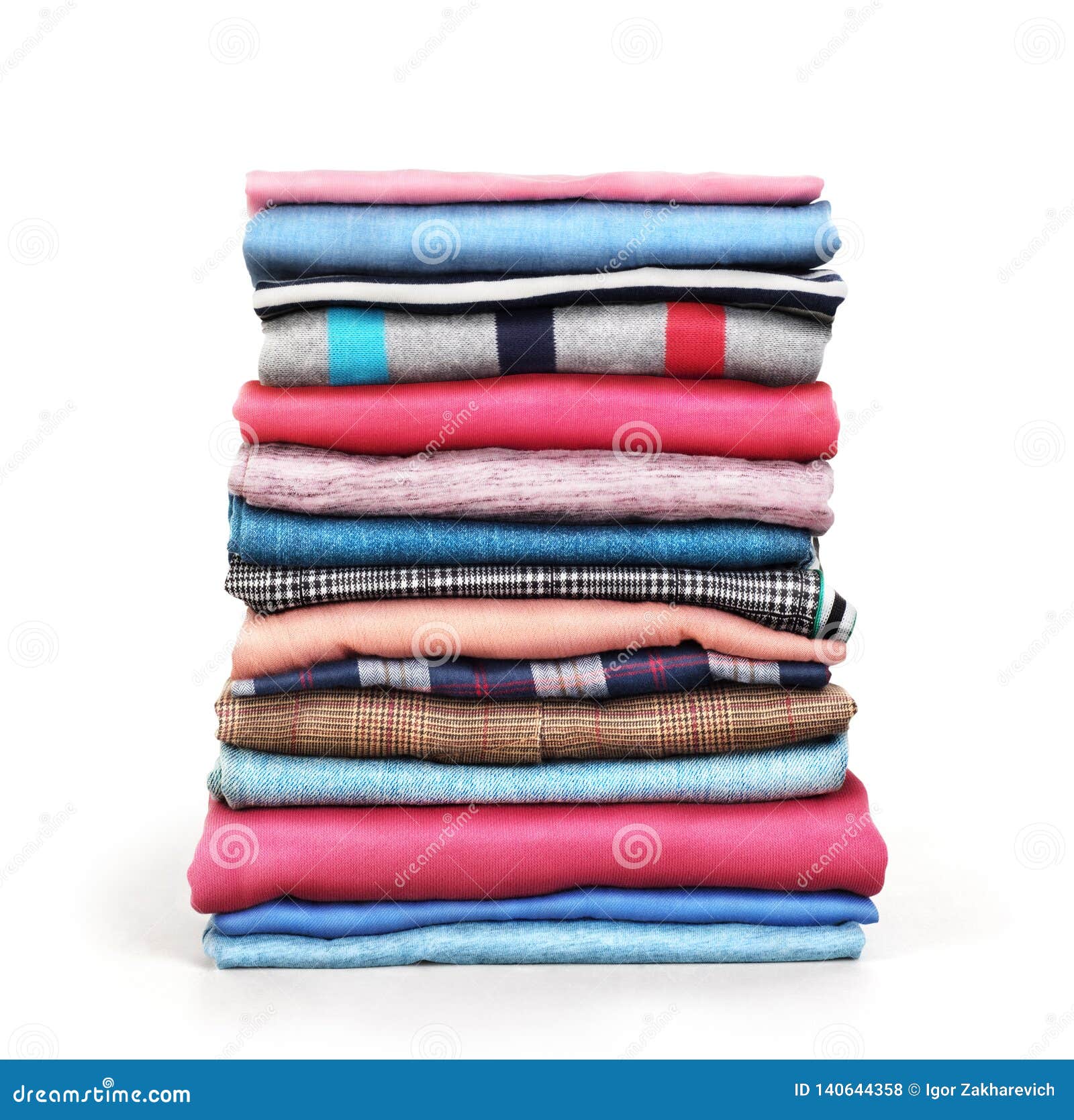 Stack of clothes isolated stock photo. Image of pants - 140644358