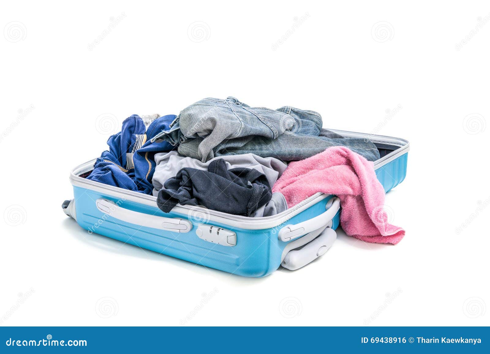 Stack of Clothes in Open Travel Bag Stock Photo - Image of handbag ...