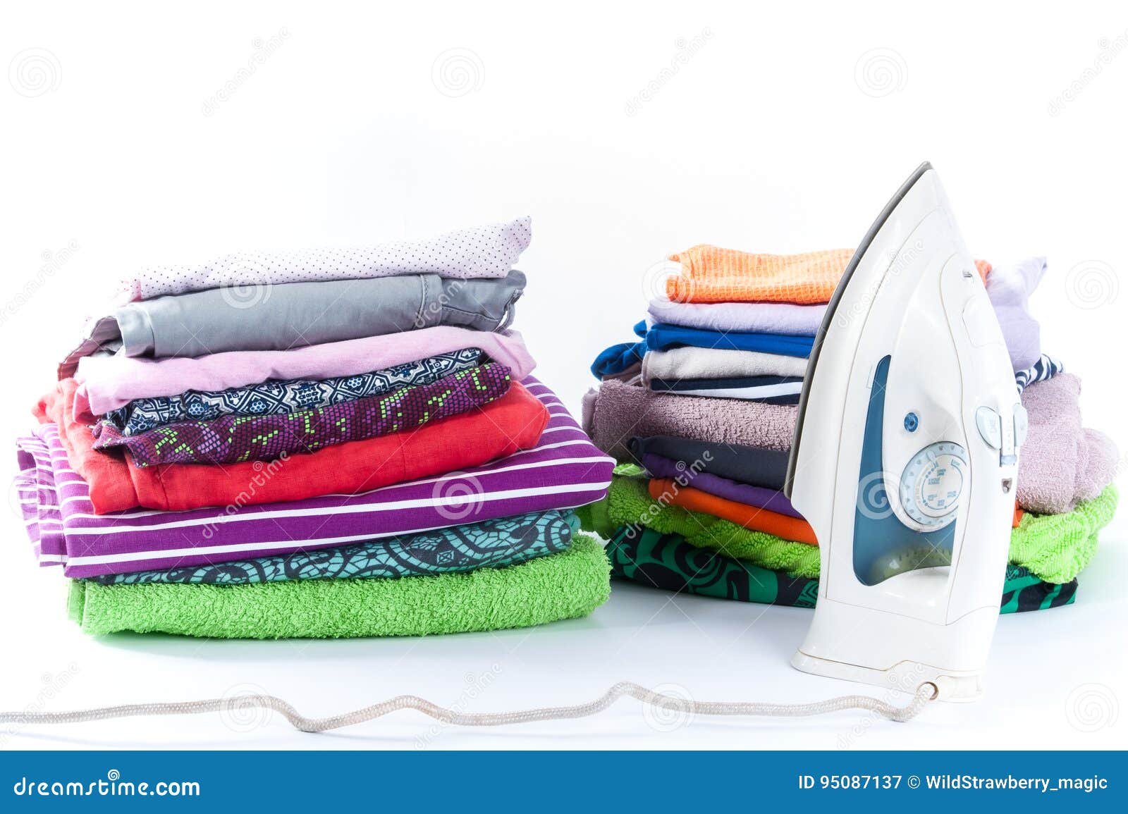 Stack of Clothing and Iron on a White Background Stock Image - Image of ...
