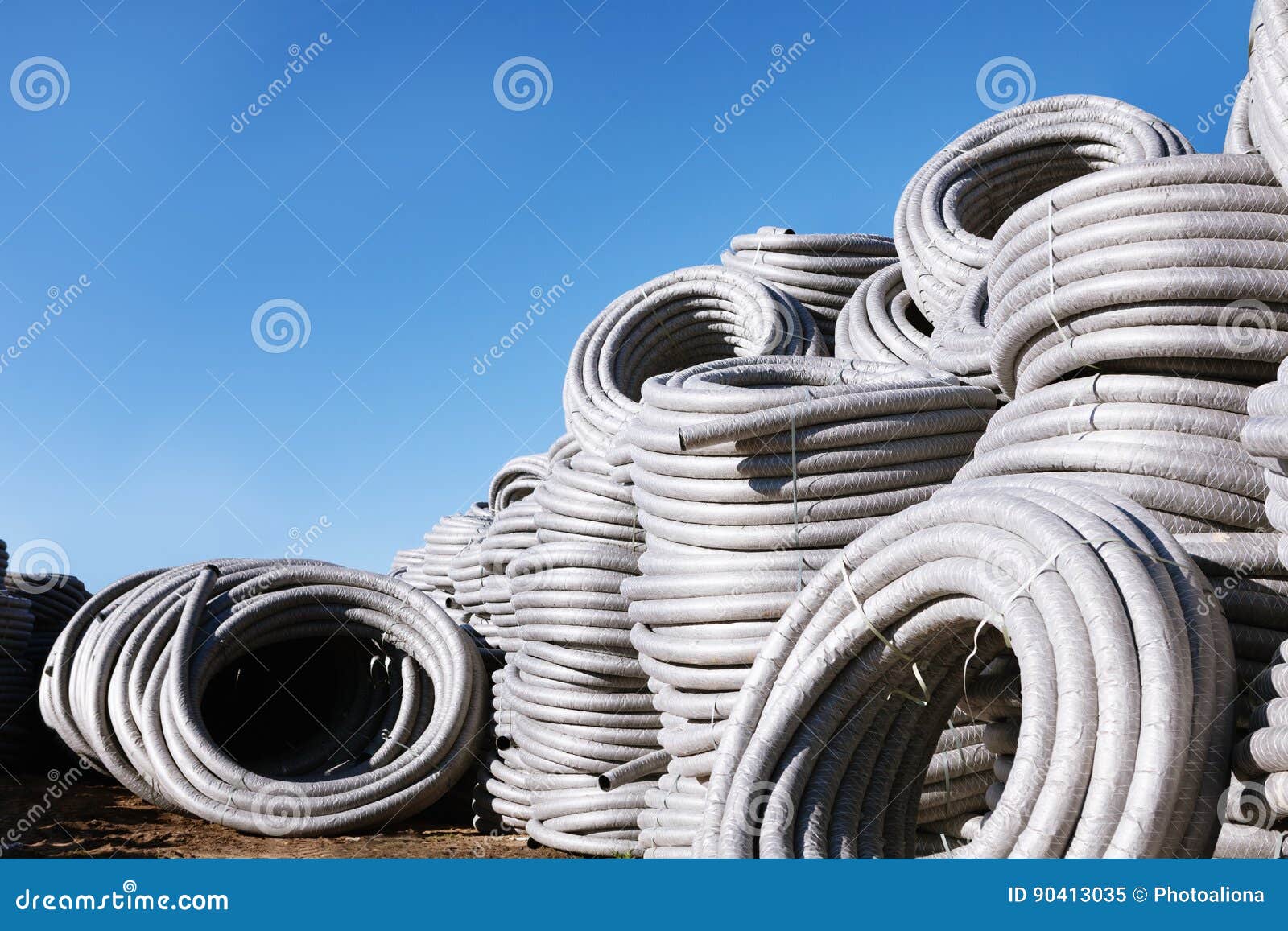 Stack of Coiled Plastic Pvc Polyethylene Corrugated Drainage Pipes for ...
