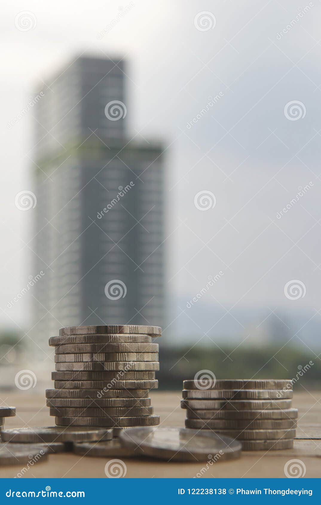 Stack of Coins on Blur Building Background,coin Tower Stock Photo ...
