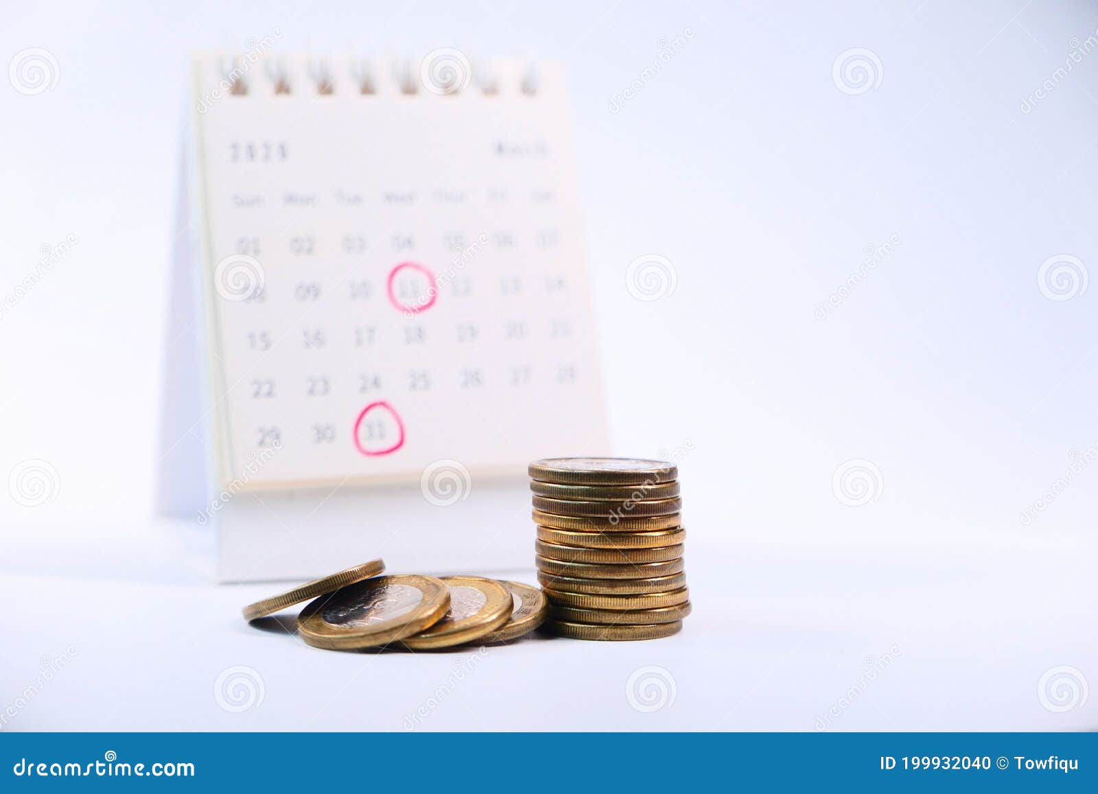 Stack of Coins and Calendar on White Background Stock Photo - Image of ...