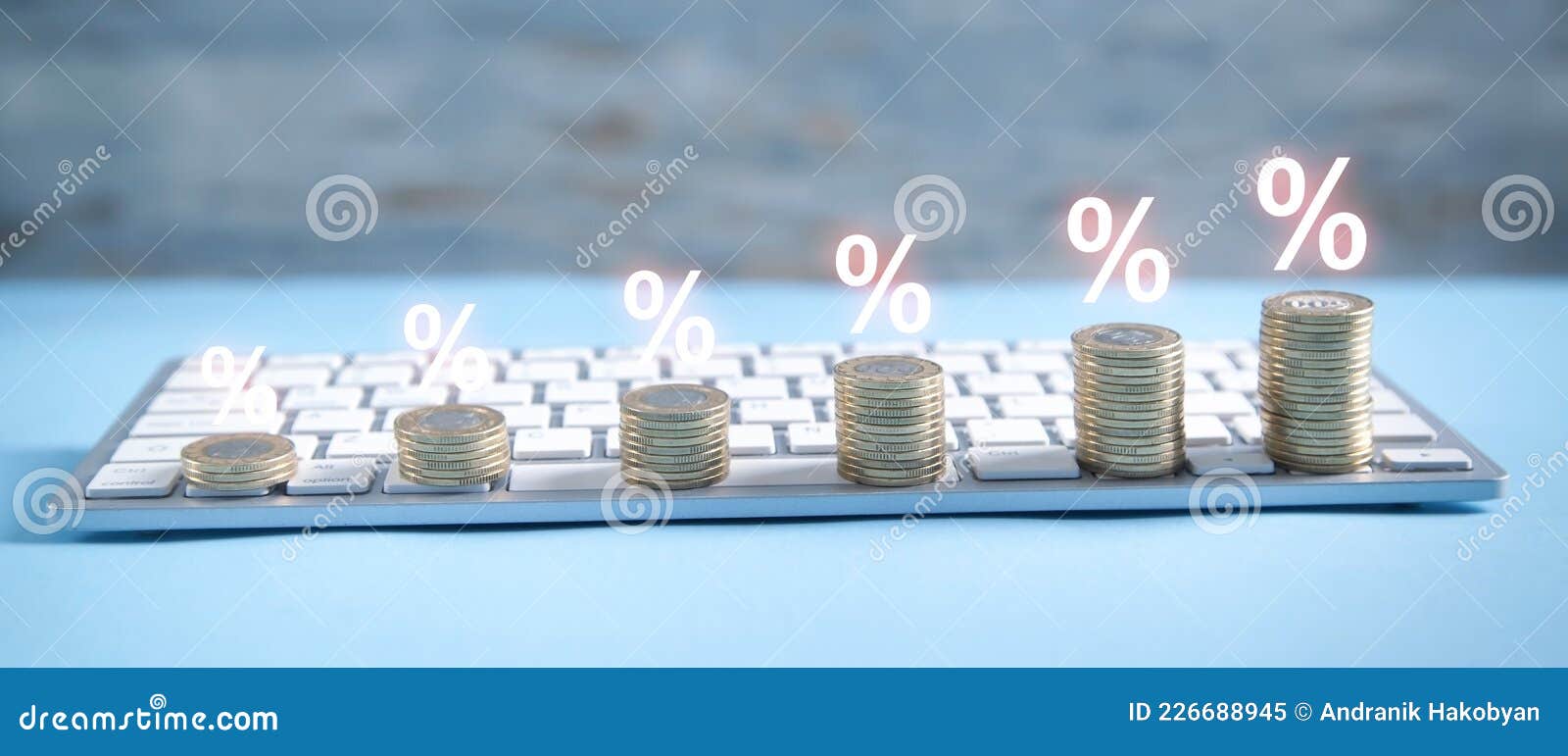 Stack of Coins on Computer Keyboard with a Percent Symbols Stock Image ...
