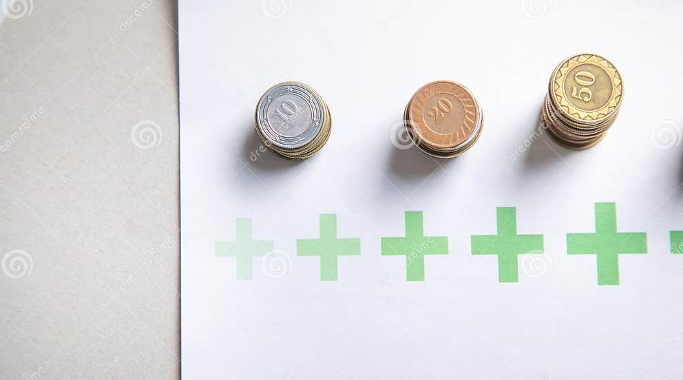 Stack of Coins with a Growing Plus Signs Stock Image - Image of growth ...