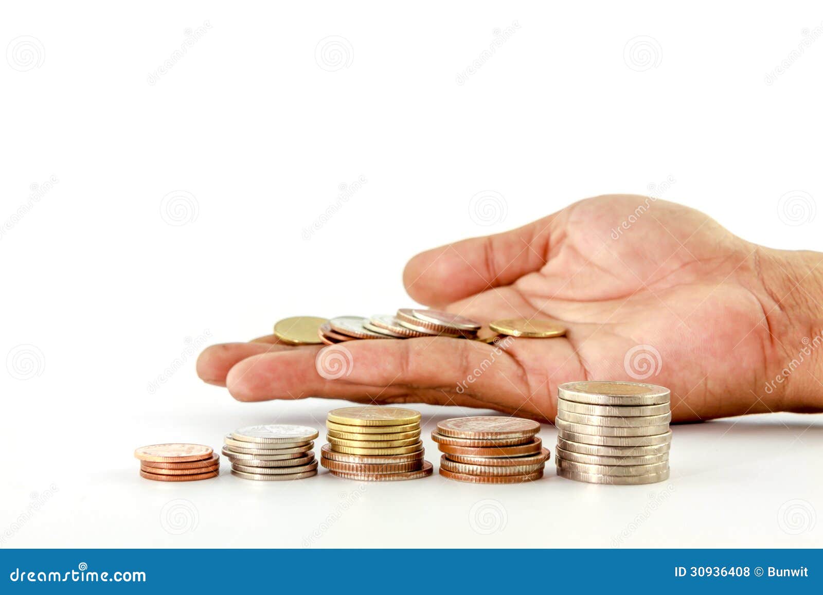 Stack of coins in hand stock photo. Image of economic - 30936408
