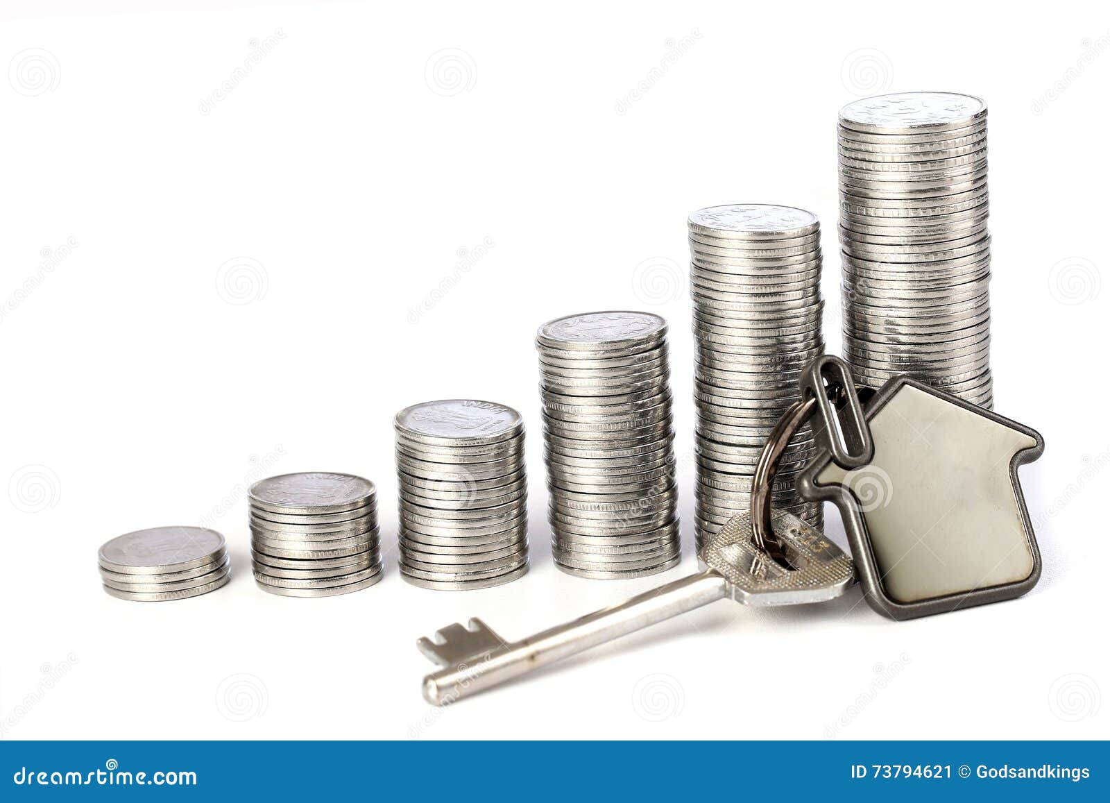 Stack of Coins with House Shape Key Stock Image - Image of house, grow ...