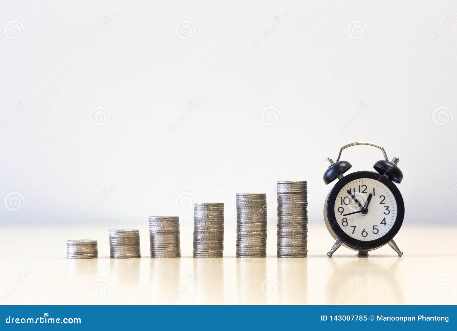 Stack of Coins Increasing Coins with Alarm Clock Stock Image - Image of ...