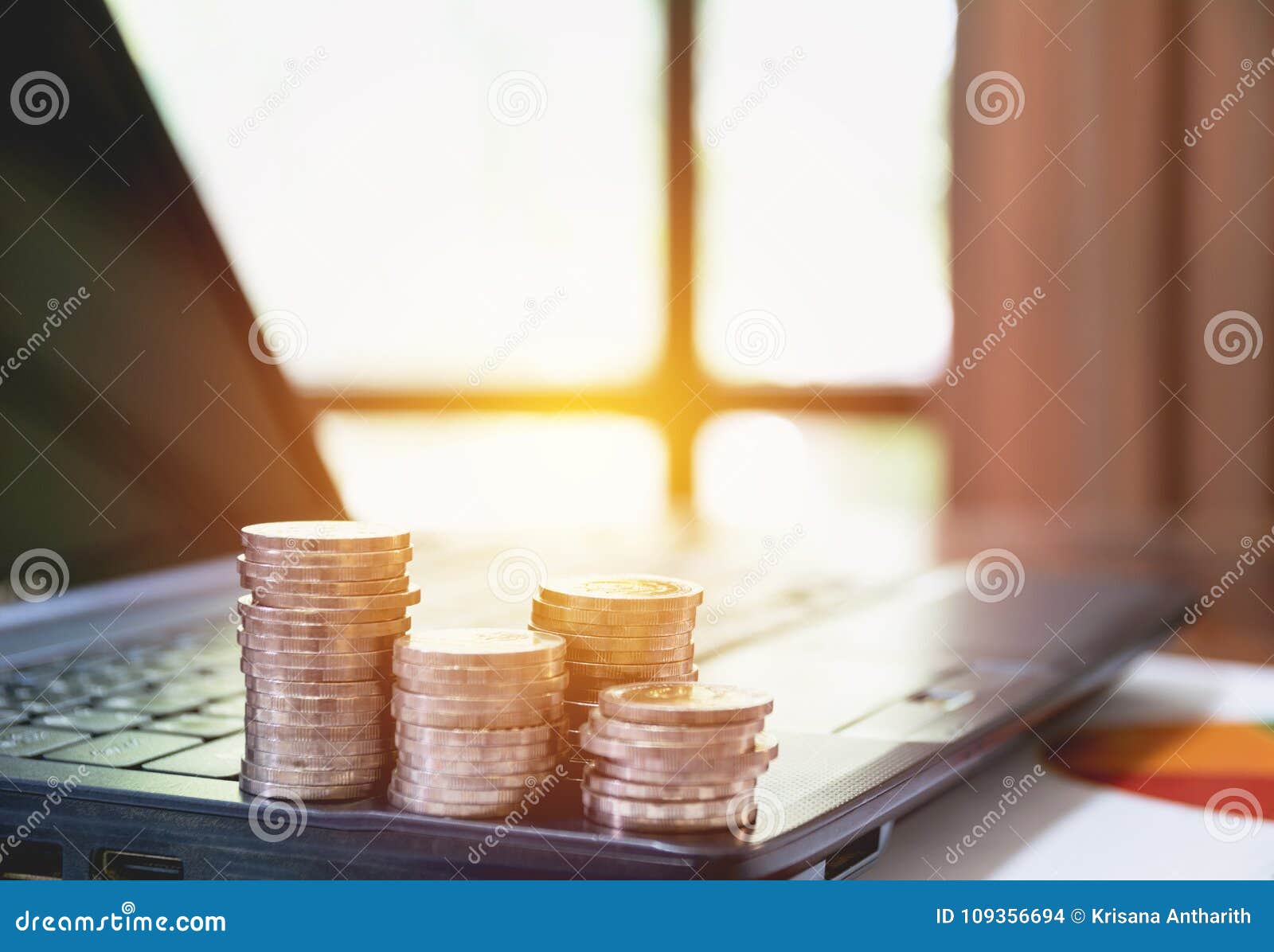 Stack Coins on Laptop. Financial, Accounting and Saving Concept Stock ...
