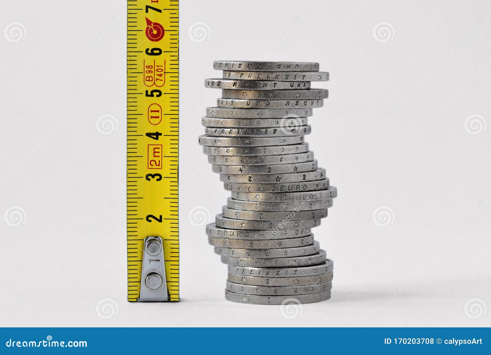 Stack of Coins with Meter Tool - Concept of Measuring Money Value Stock ...