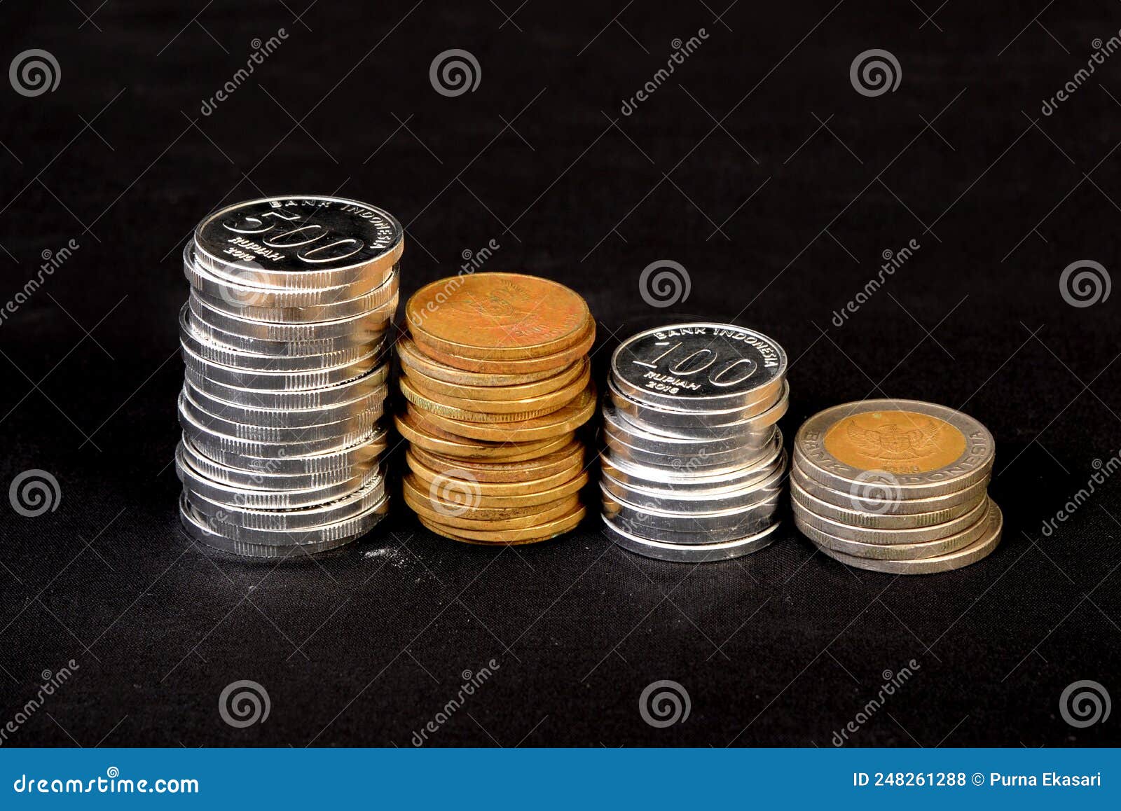 Stack of Coins Neatly Arranged on Black Background Stock Photo - Image ...