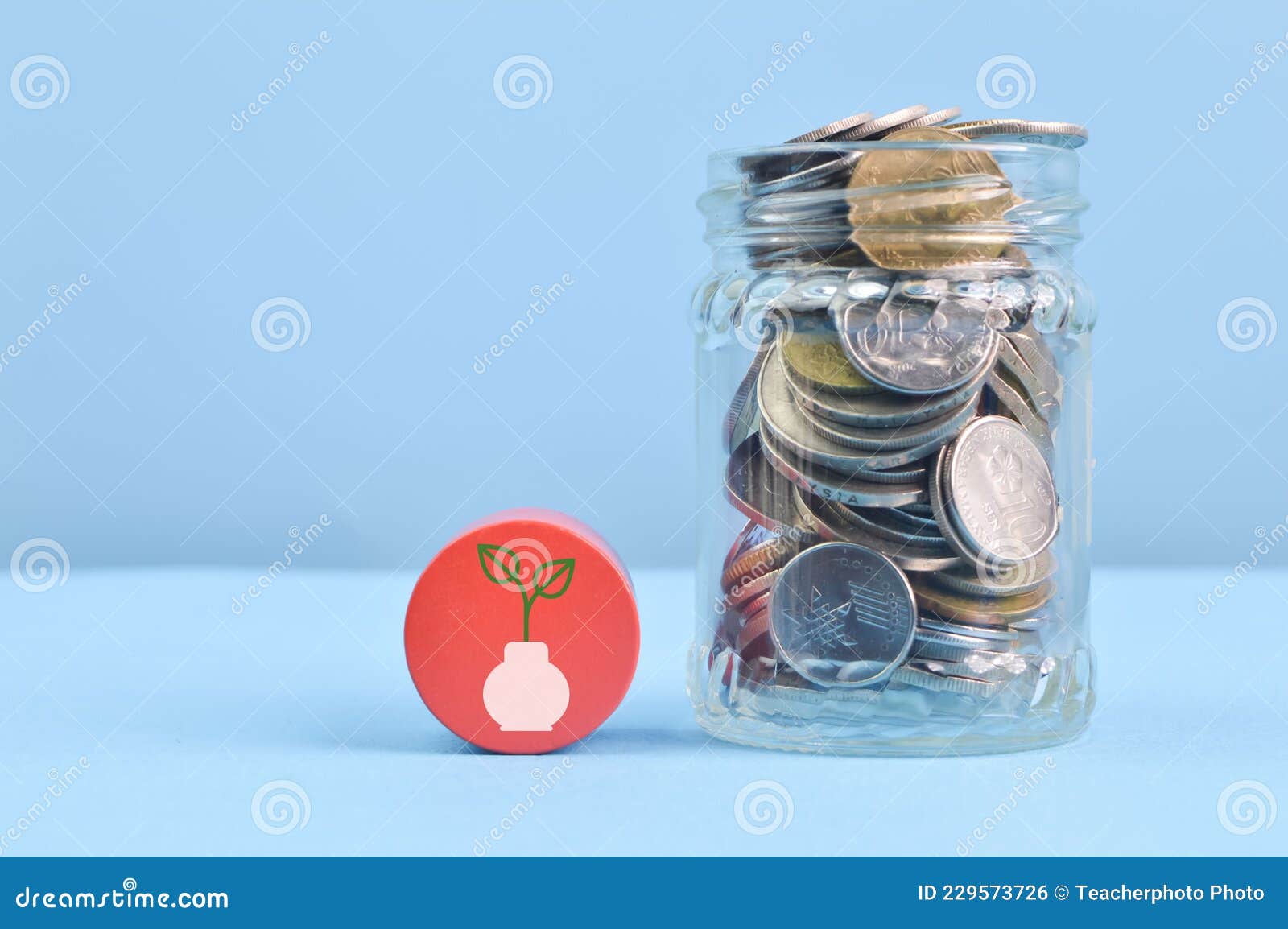 Stack of Coins with Plant Symbol. Saving Concept Stock Photo - Image of ...