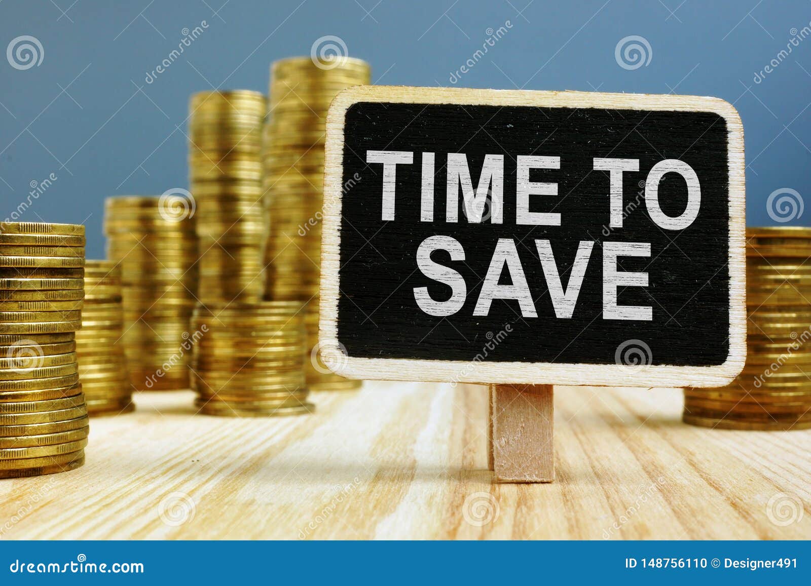 Stack of Coins and Sign Time To Save Money Stock Photo - Image of ...