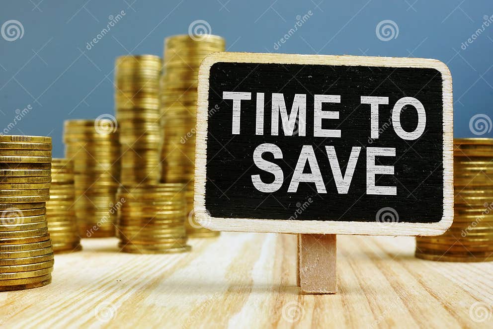 Stack of Coins and Sign Time To Save Money Stock Photo - Image of ...