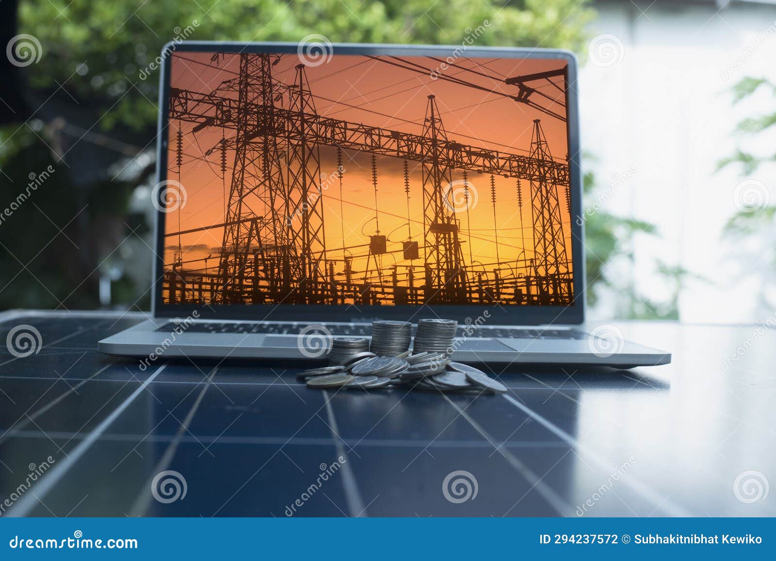 Stack of Coins on Solar Panel the Idea of Installing Solar Cells Gives ...