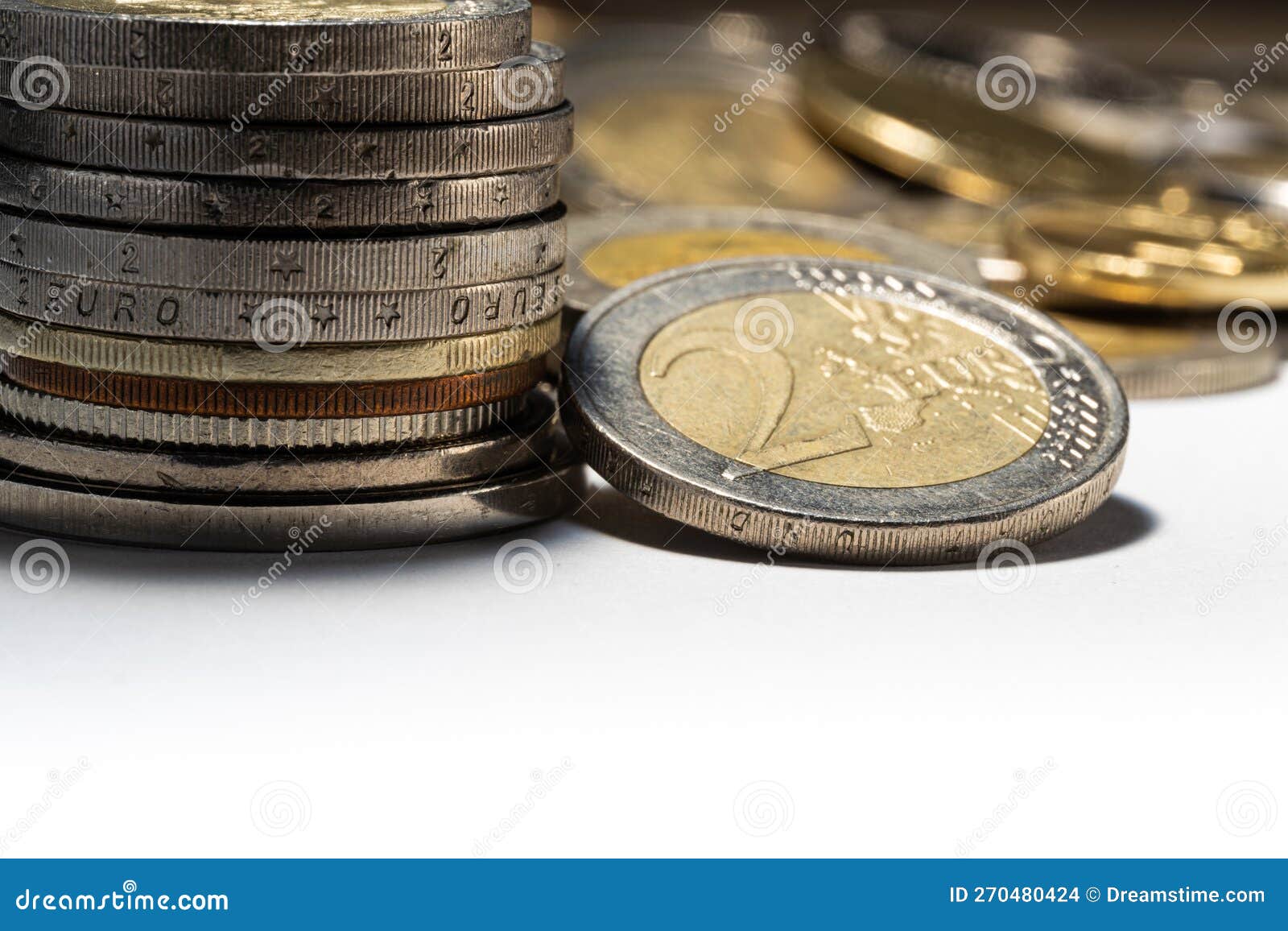 Stack of the Coins and Two Euro Coin with Soft Focus Stock Photo ...