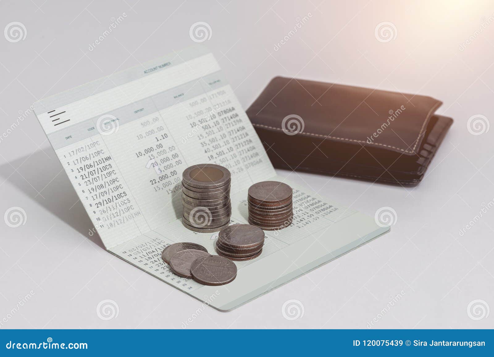 Stack of Coins and Account Book Bank on the Table Stock Image - Image ...